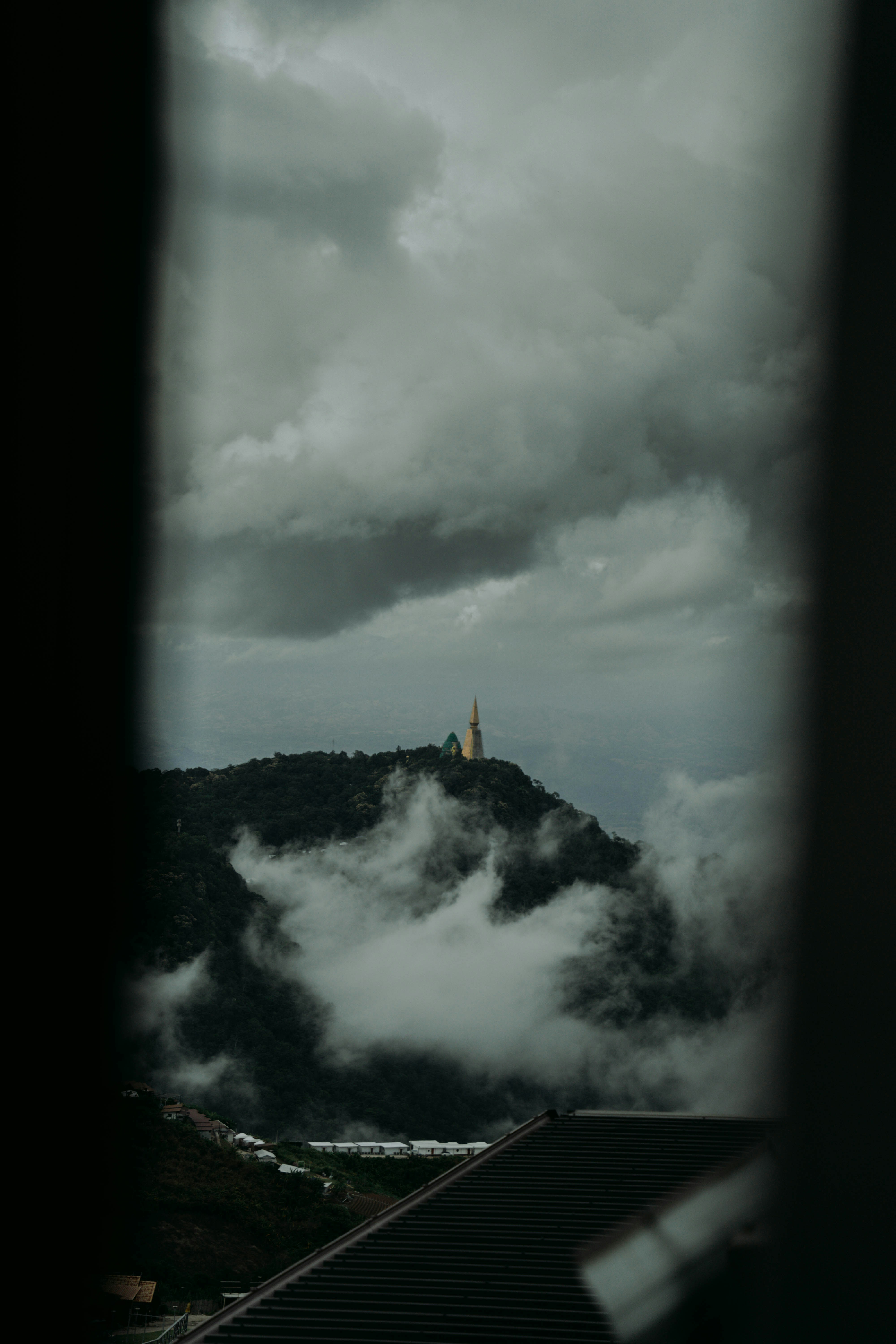  Peak of the Cloud-Washed Hilltop
