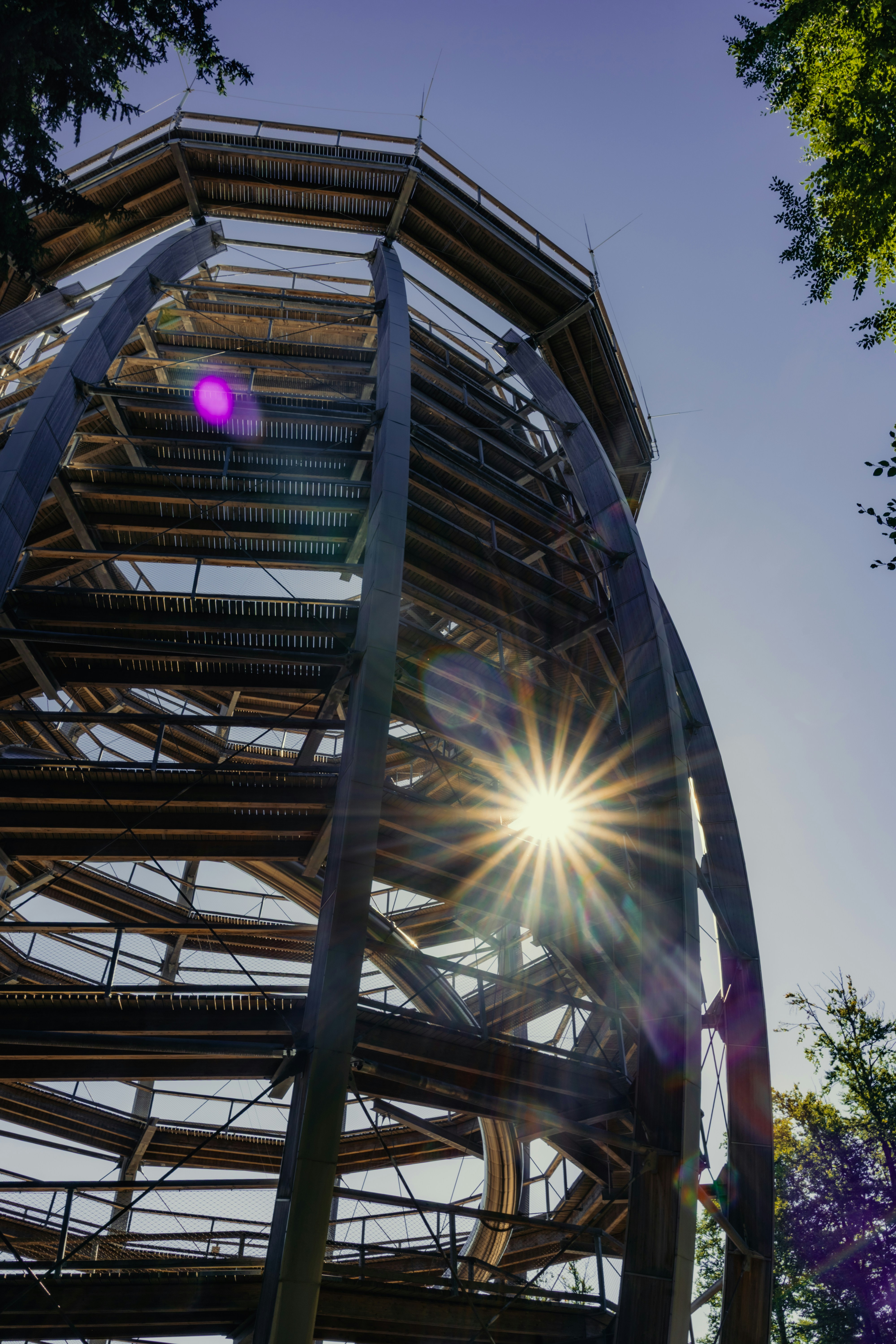 Sunburst Through the Spiral: A Steel Tower Reaches the Sky