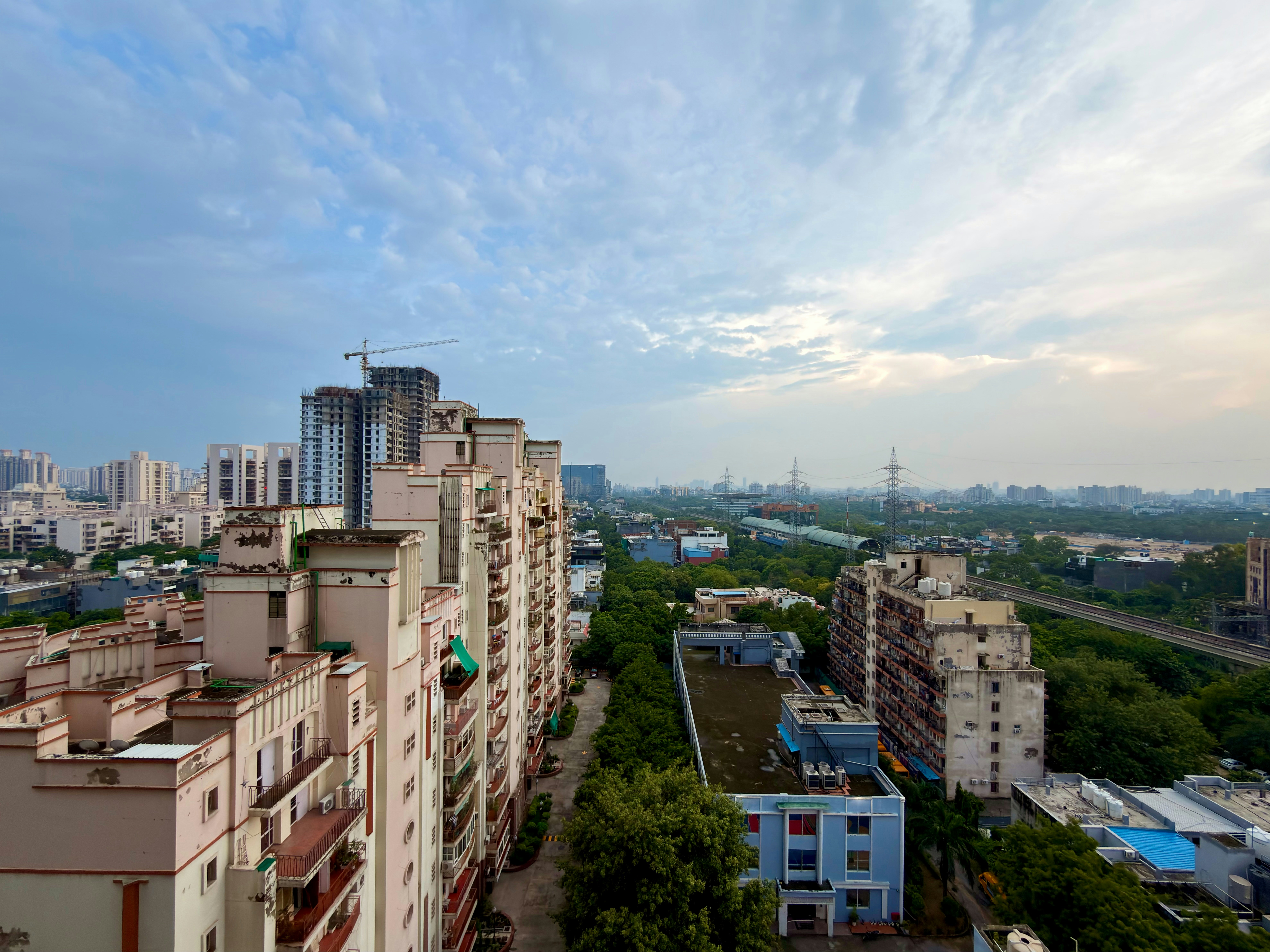 Cityscape Orchard: A Panoramic View Over Mid-Rity Homes at Dusk