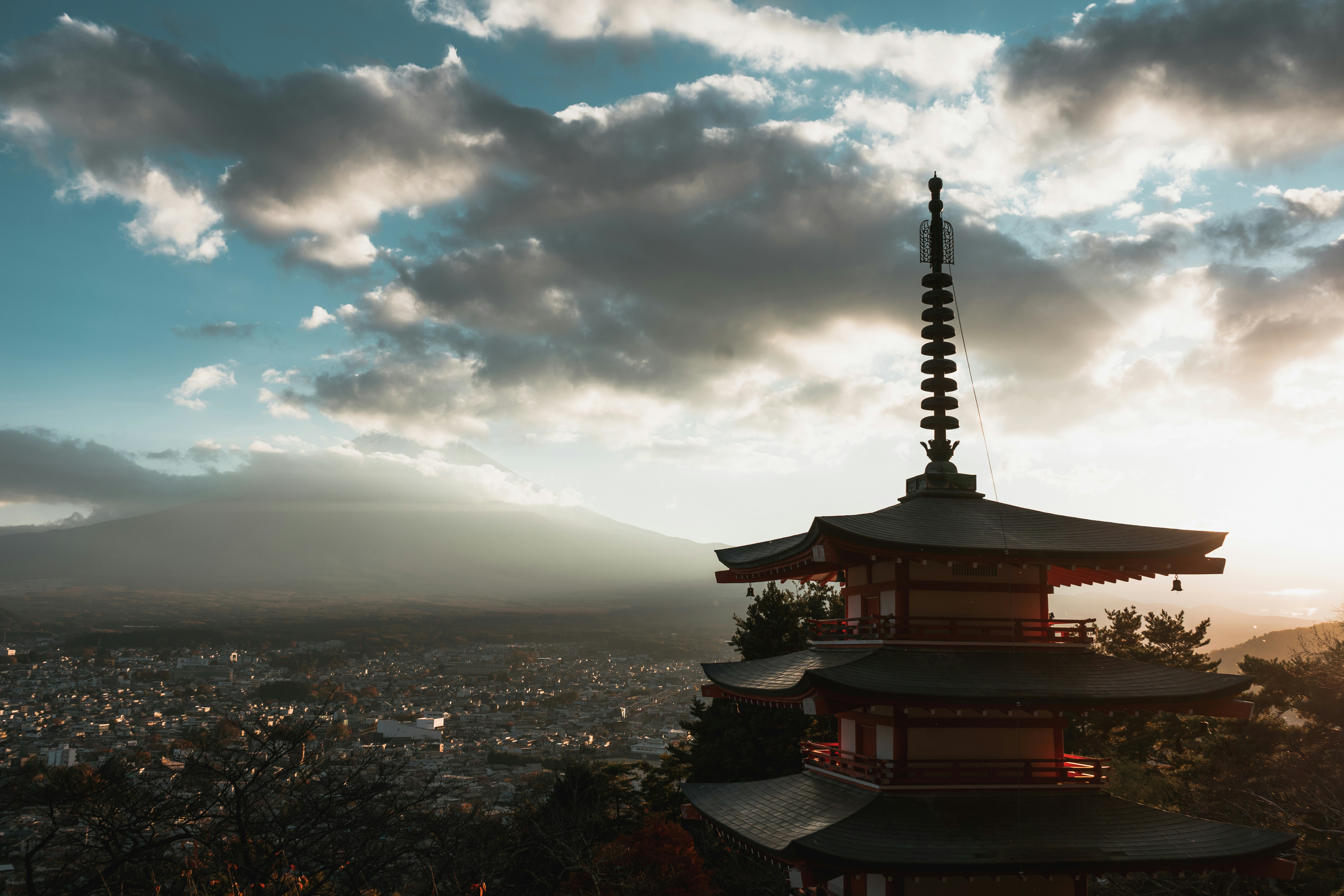 Sunset Over Kyoto: A Five-Tiered Temple against a Lanterned City