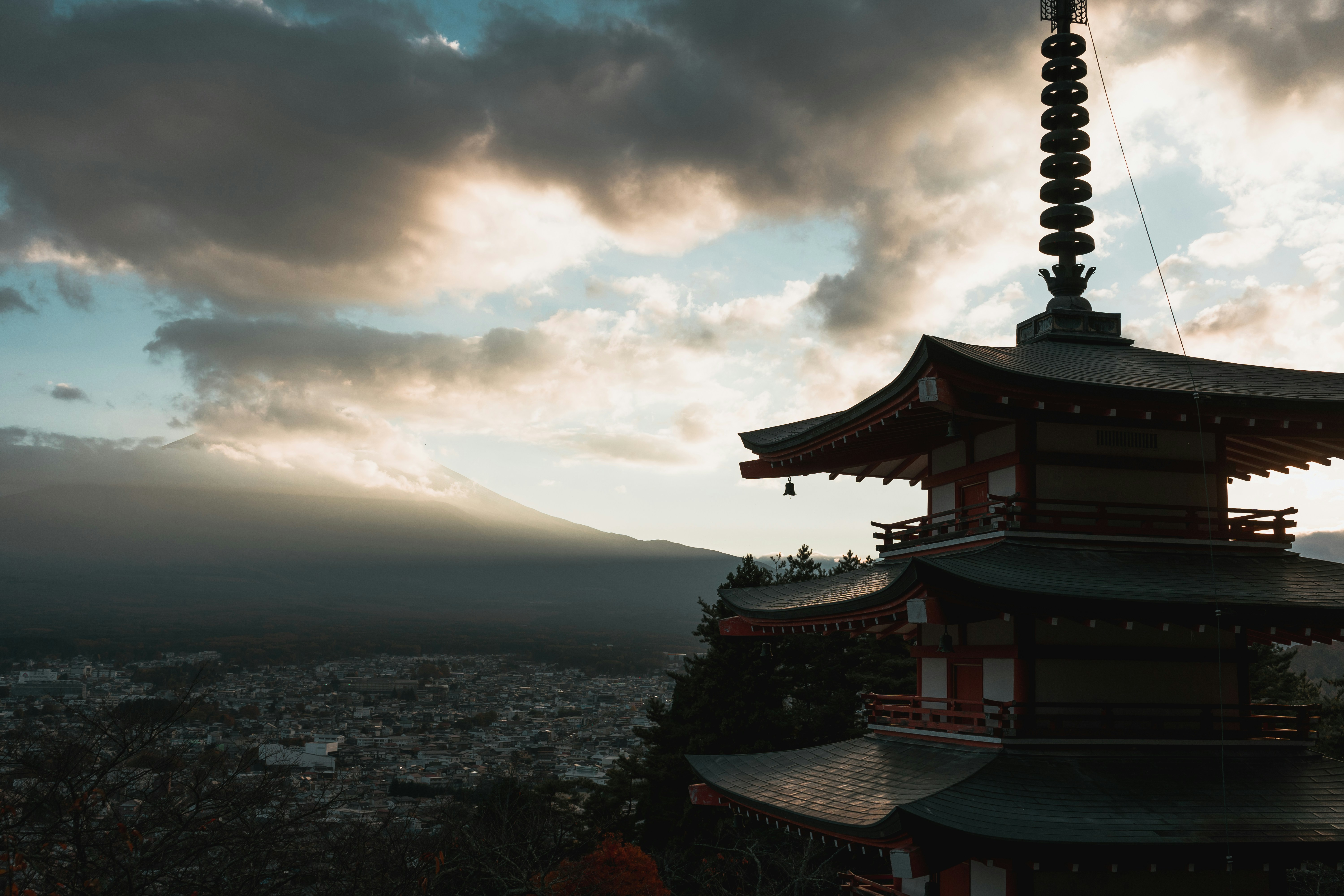 Temple Spire Over Kyoto Valley at Sunset