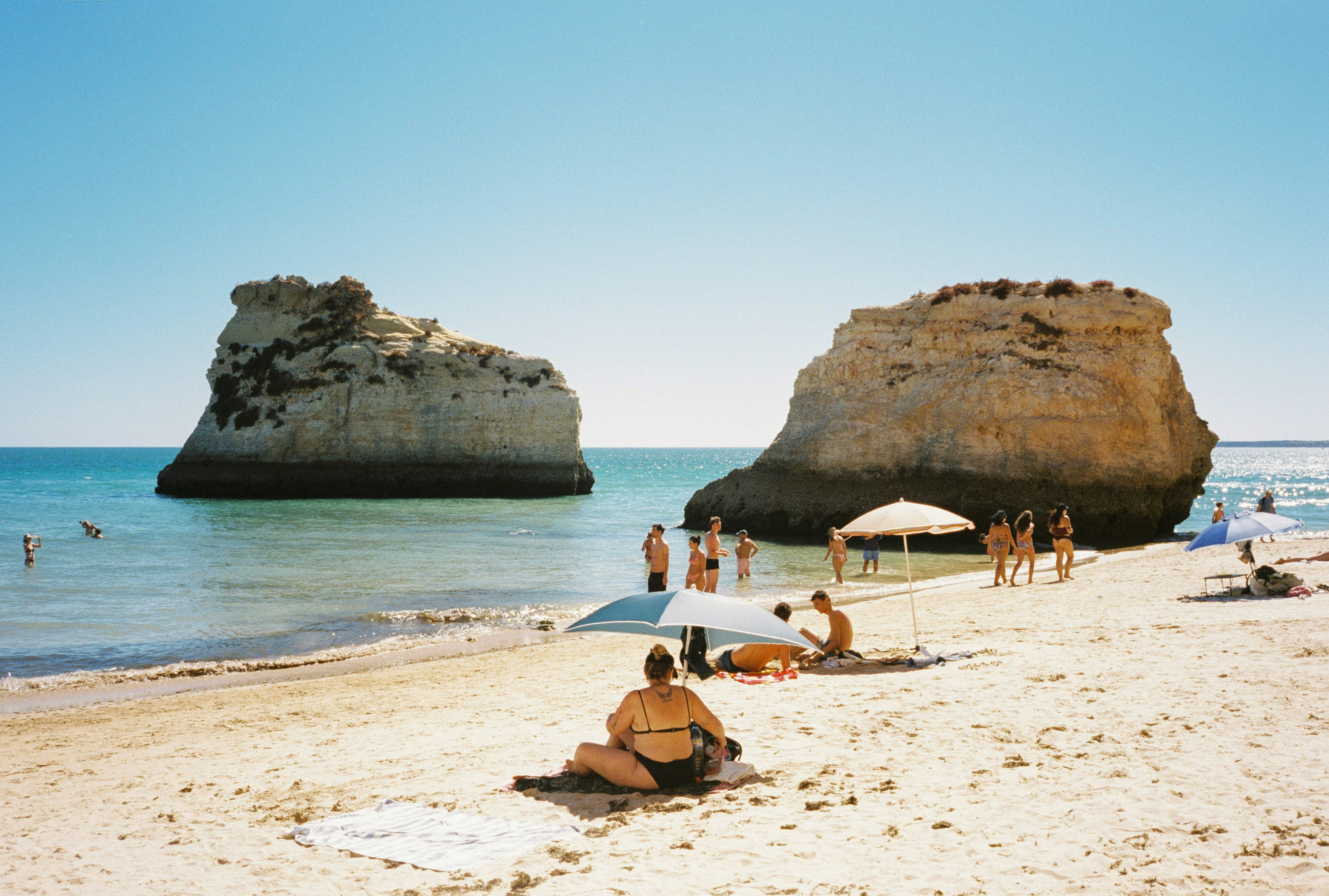 Sunlit Beachscape with Twin Sea Stacks