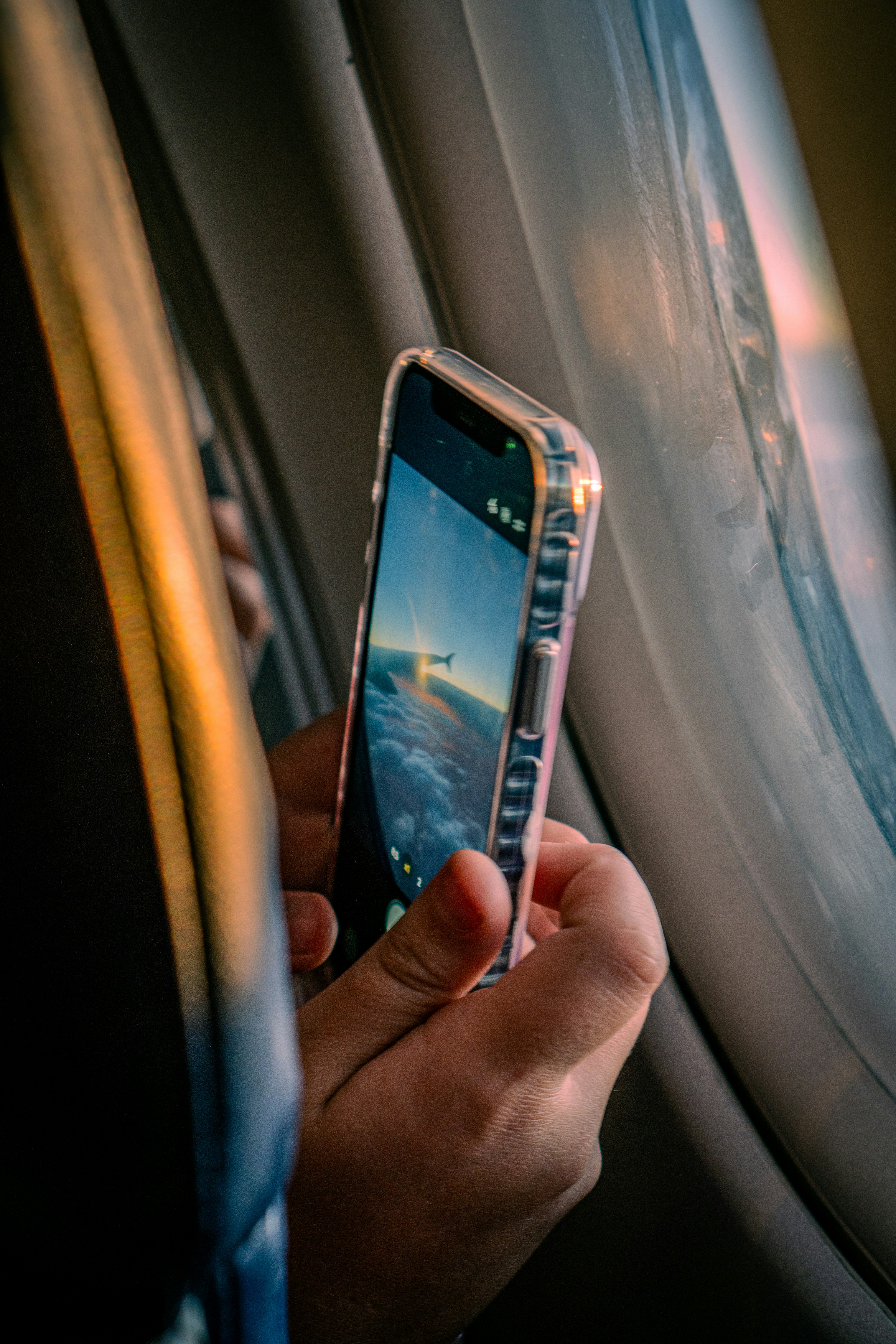 Midflight View: Comfort Focus on a Passenger's Handheld Screen