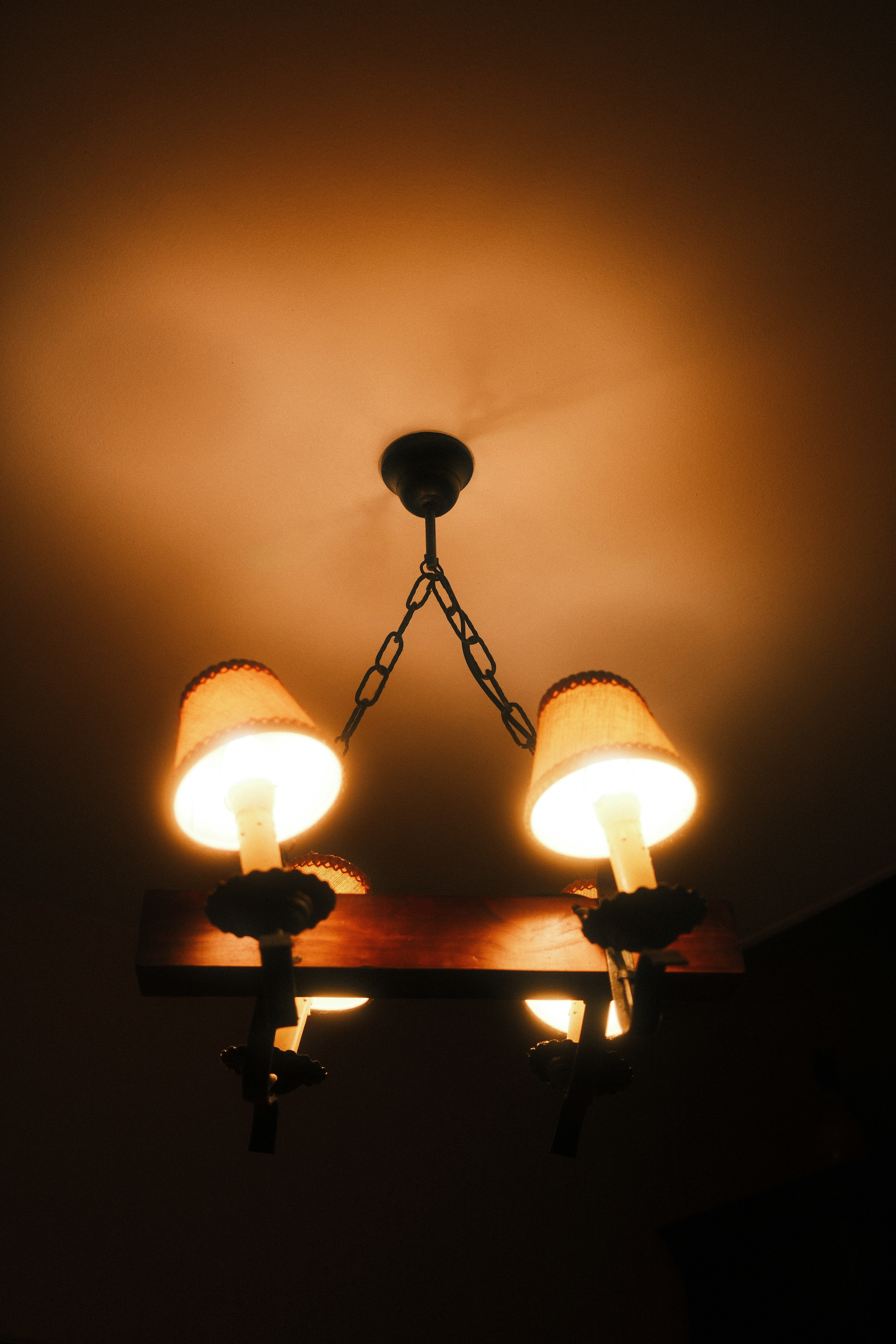 Hanging Lanterns: Warm Convergence Against a Dark Ceiling