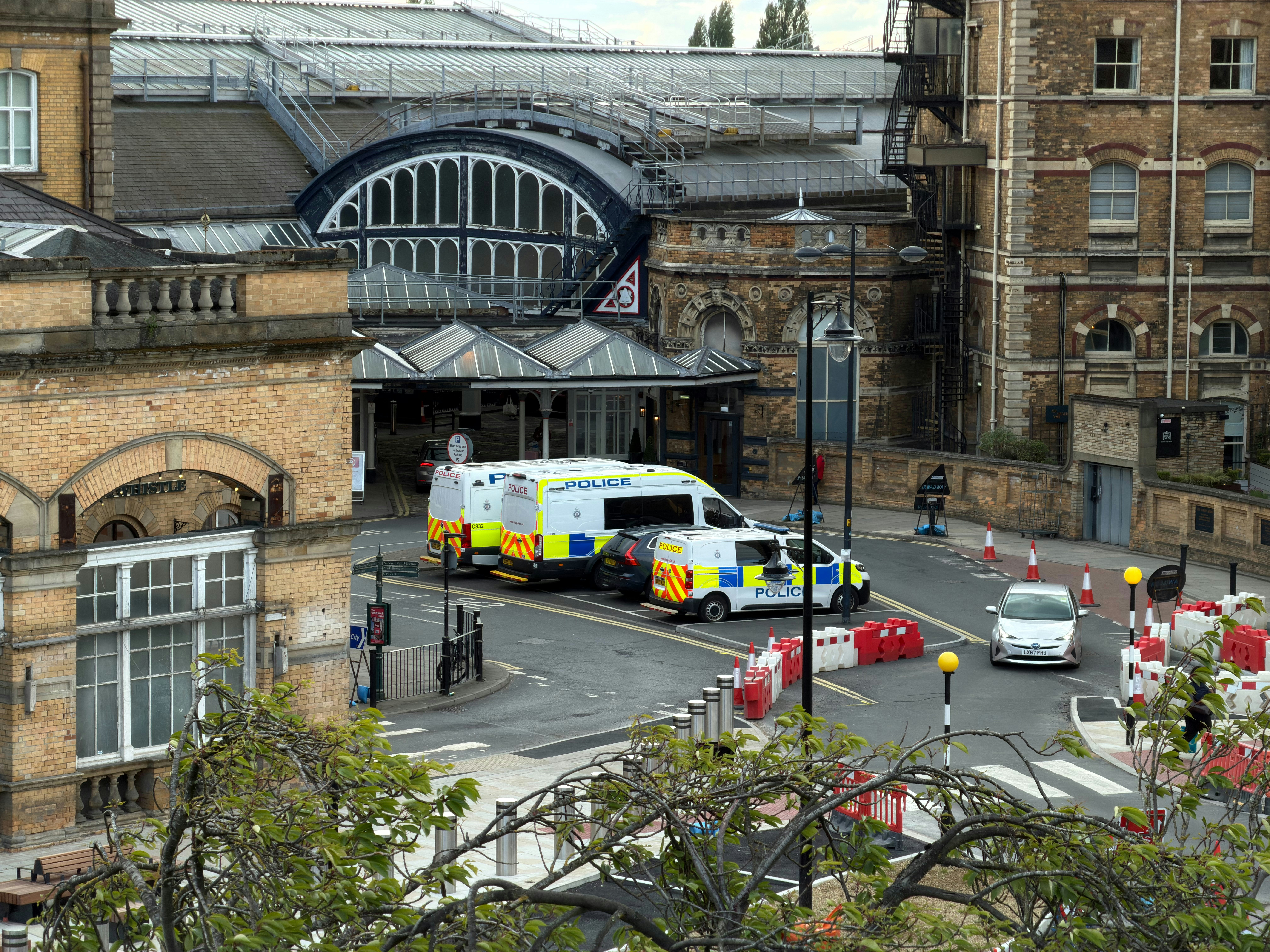 Yorkshire Courtyard: Emergency Vehicles at the Station Gate