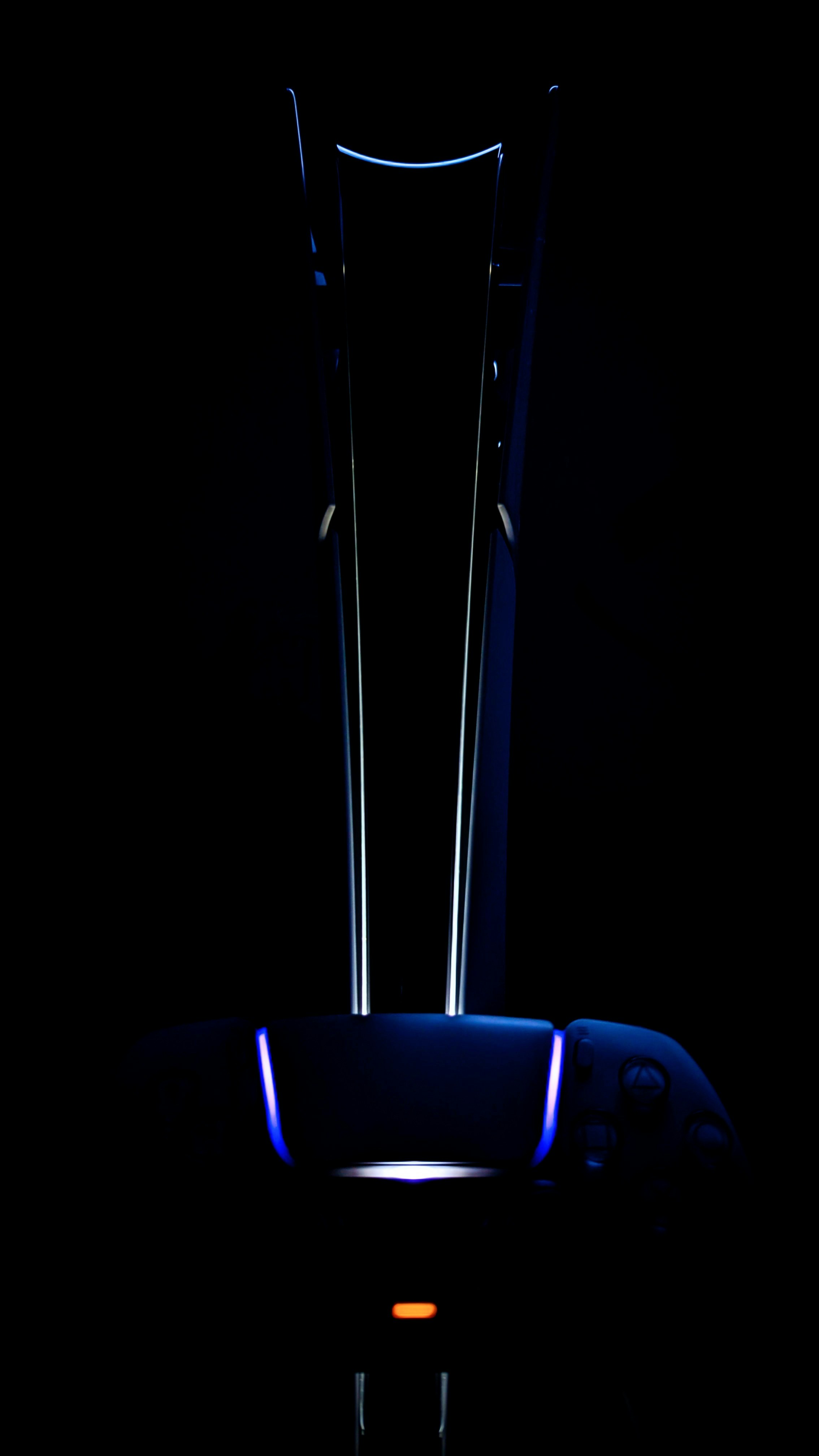 Neon-Illuminated Winged Controller at Midnight