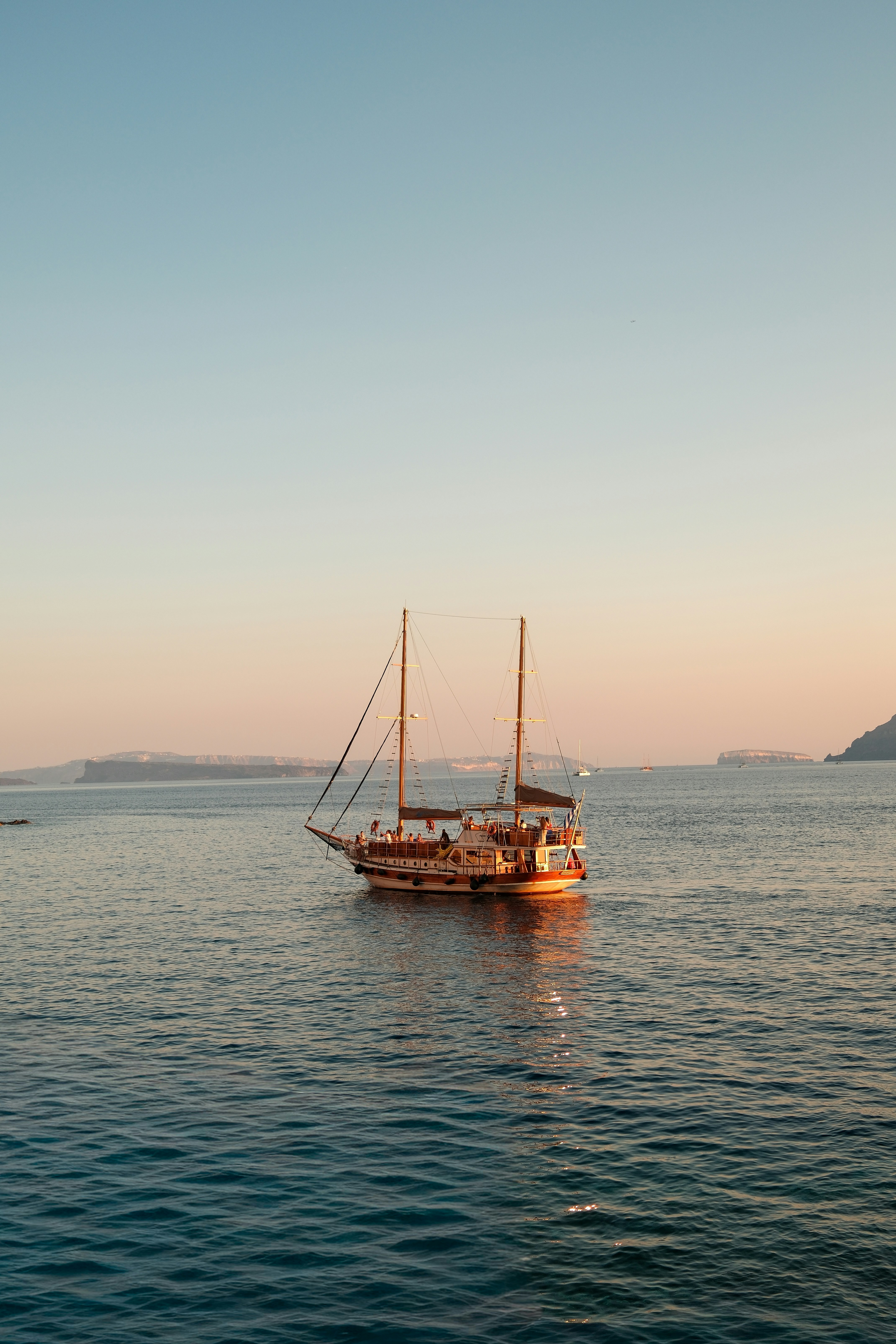 Sailing Vessel in Calm Twilight