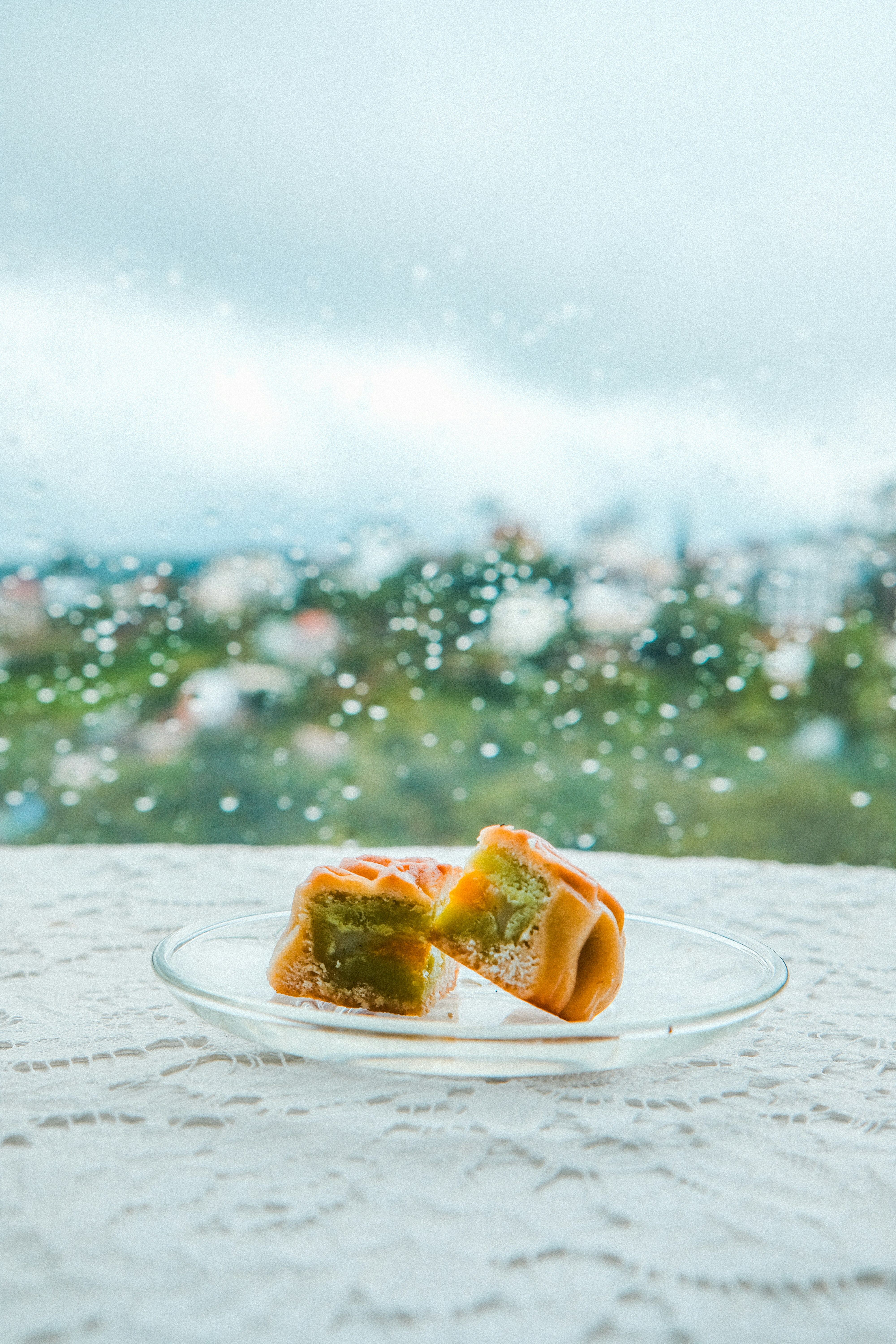 Miniature Moonlit Pastry on a Rainy Window
