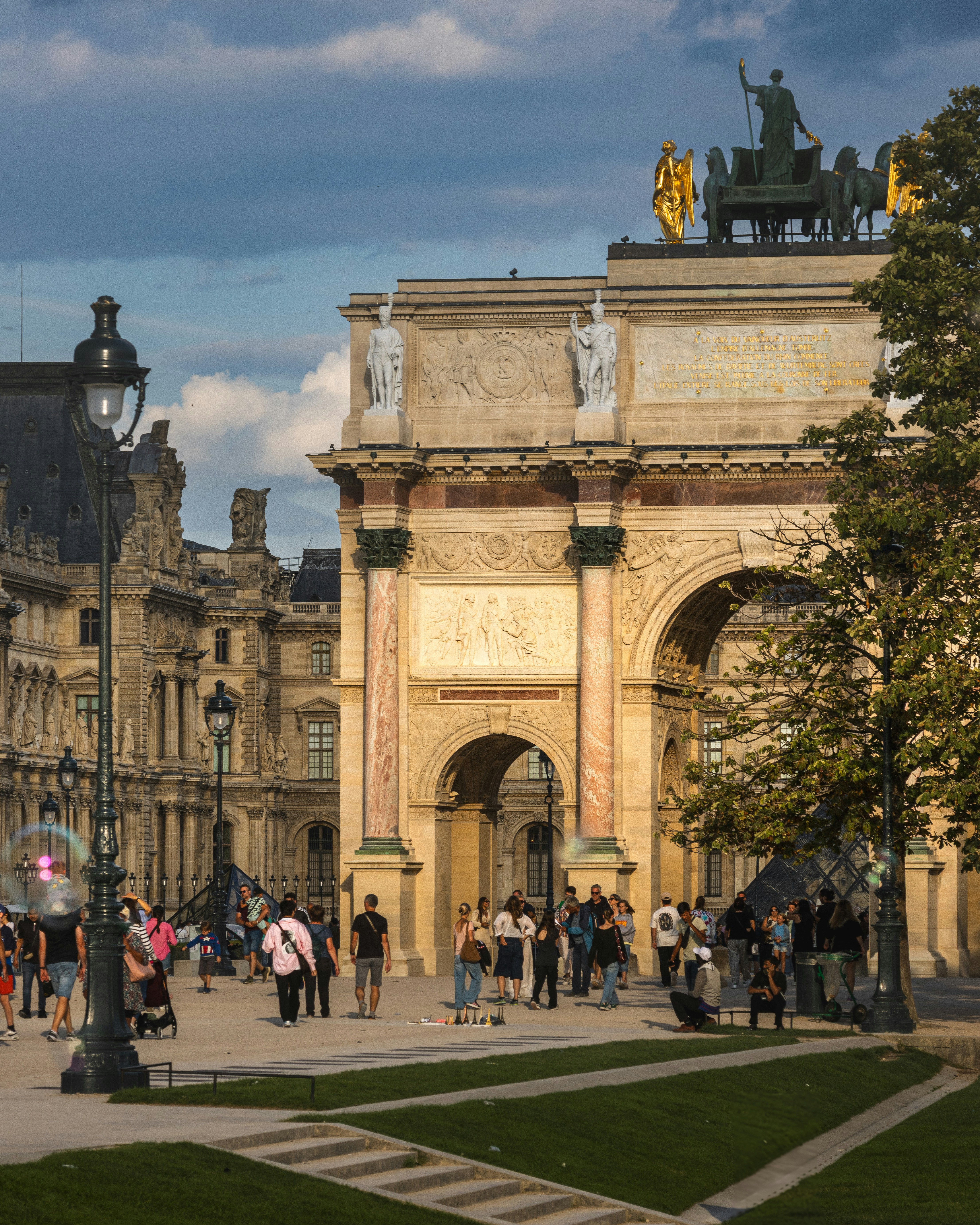 Triumphal Arch at Dusk: Visitors Framing the Monument