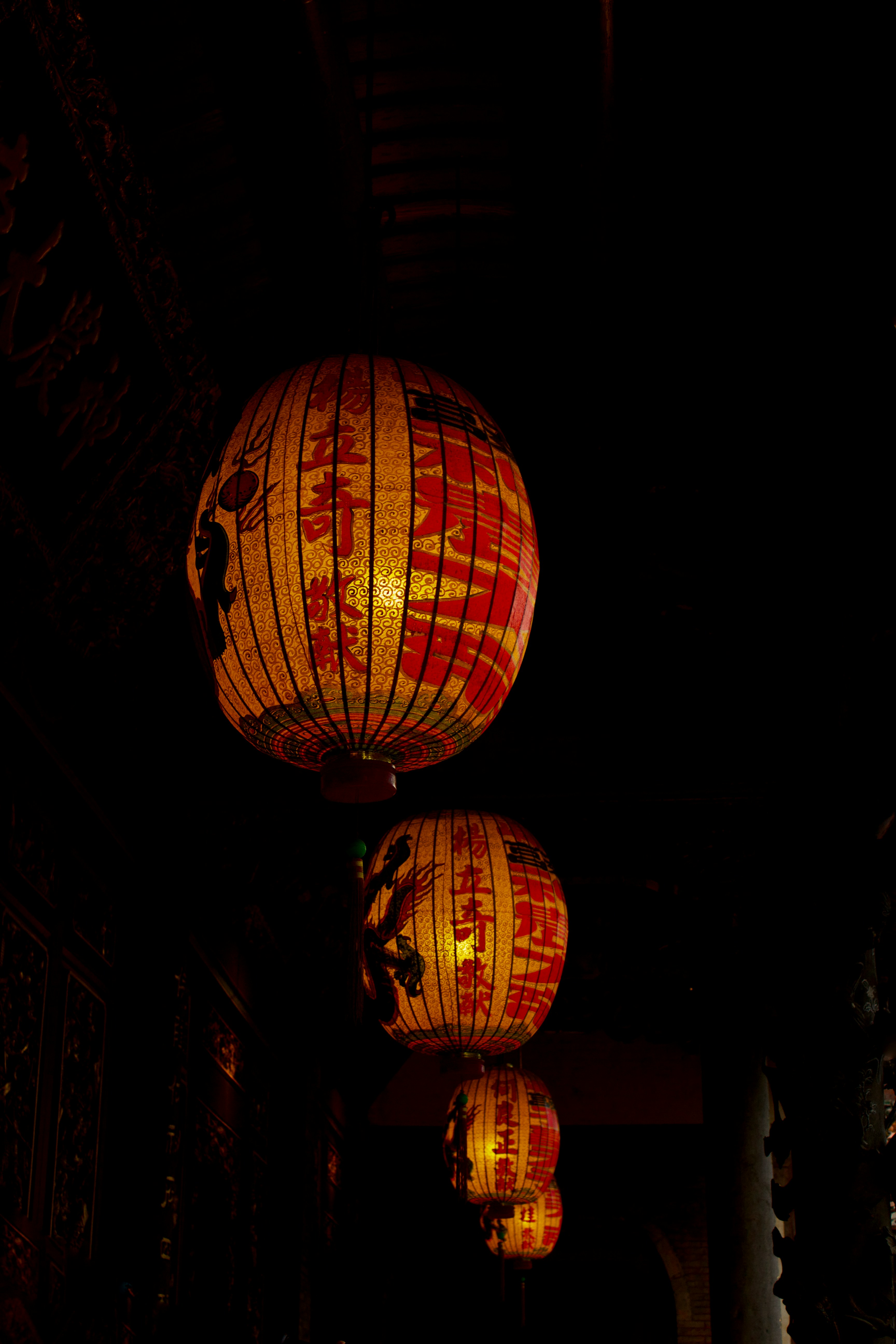 Lanterns Along a Shadowed Passage