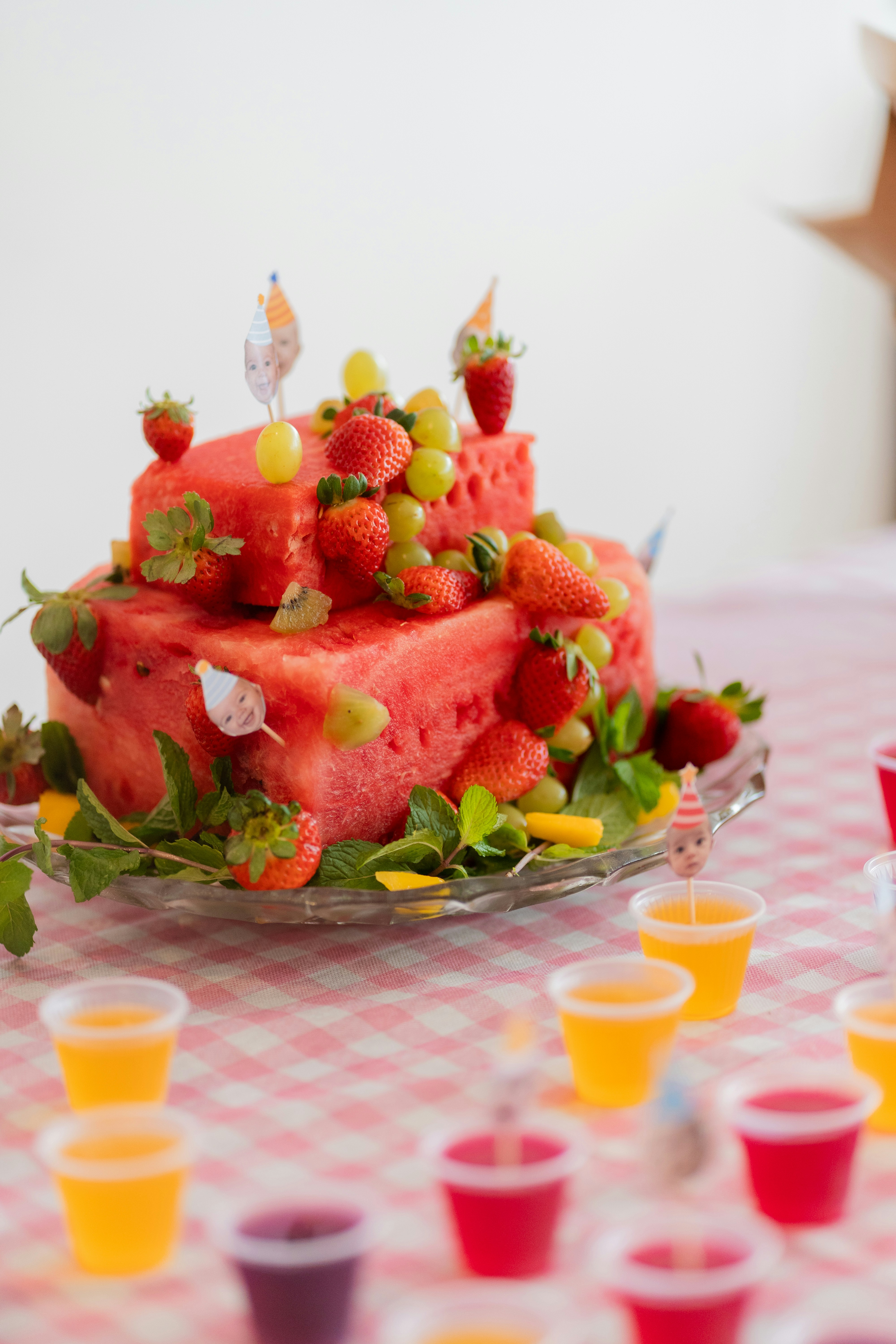 Watermelon Celebration Cake Surrounded by Fruit Party Cups