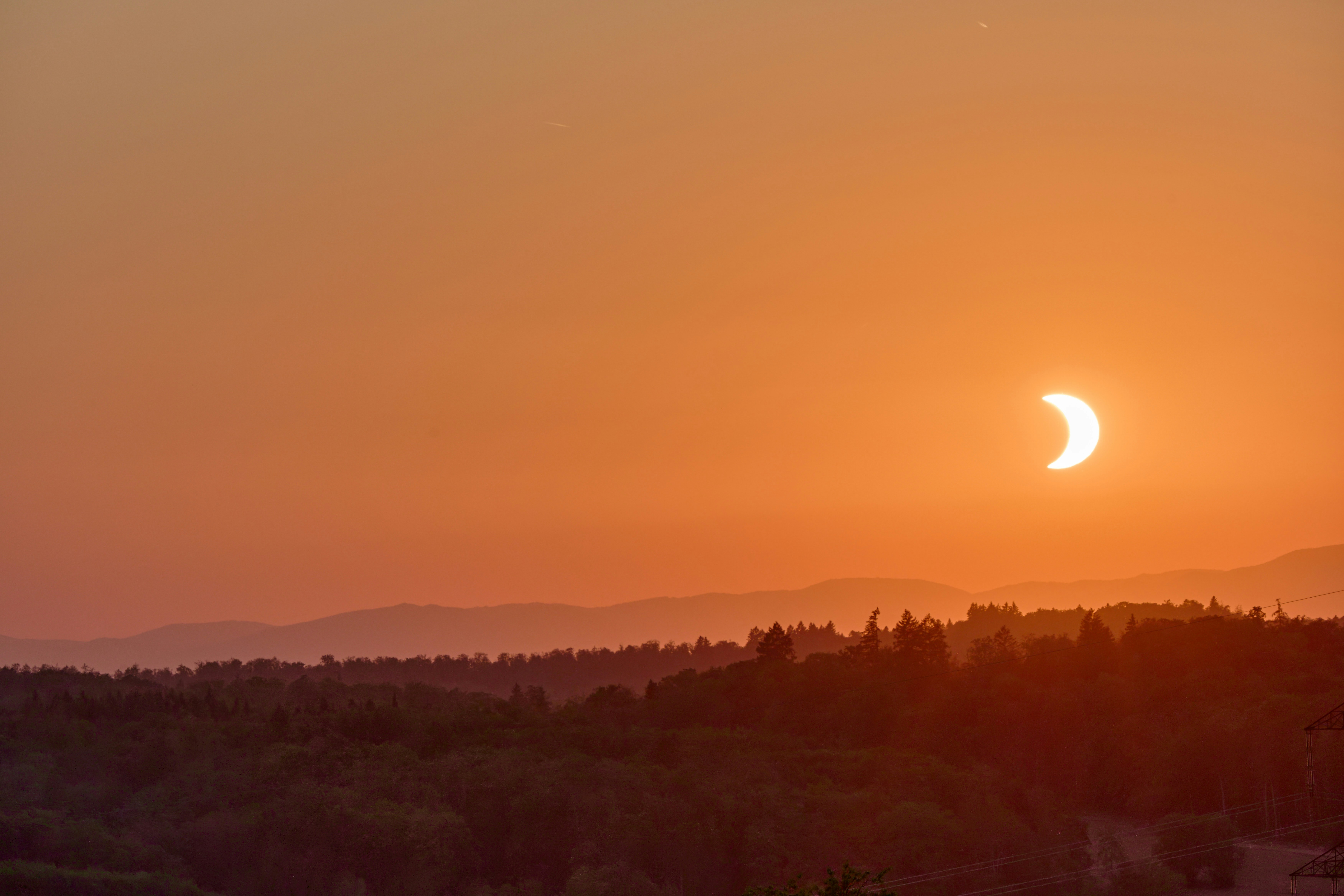 Crescent Glow Over Sunset Ridge