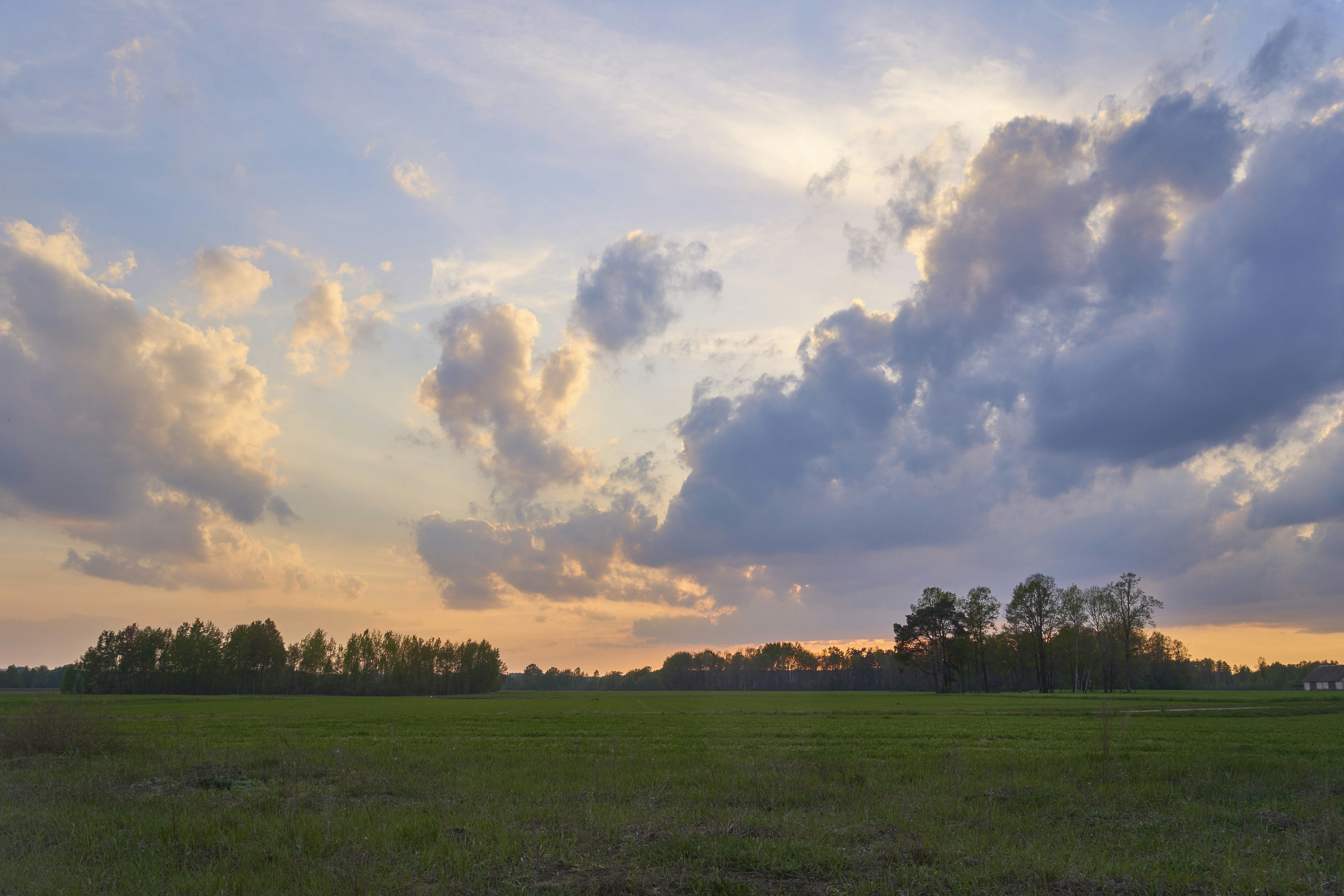 Whispering Clouds Over a Quiet Prairie at Dusk