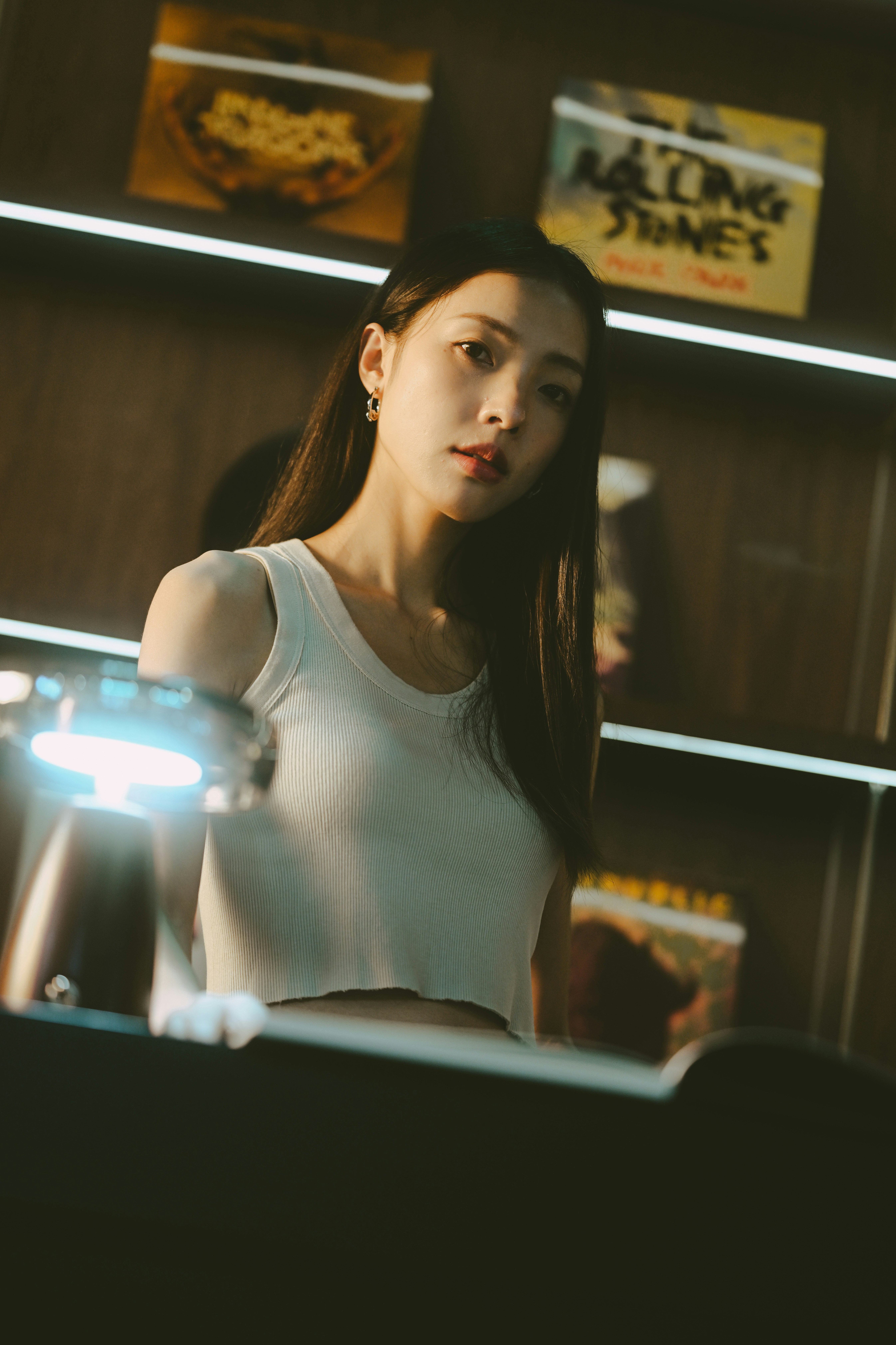 Neon-lit Quiet: A Portrait Under Caf9 Glow