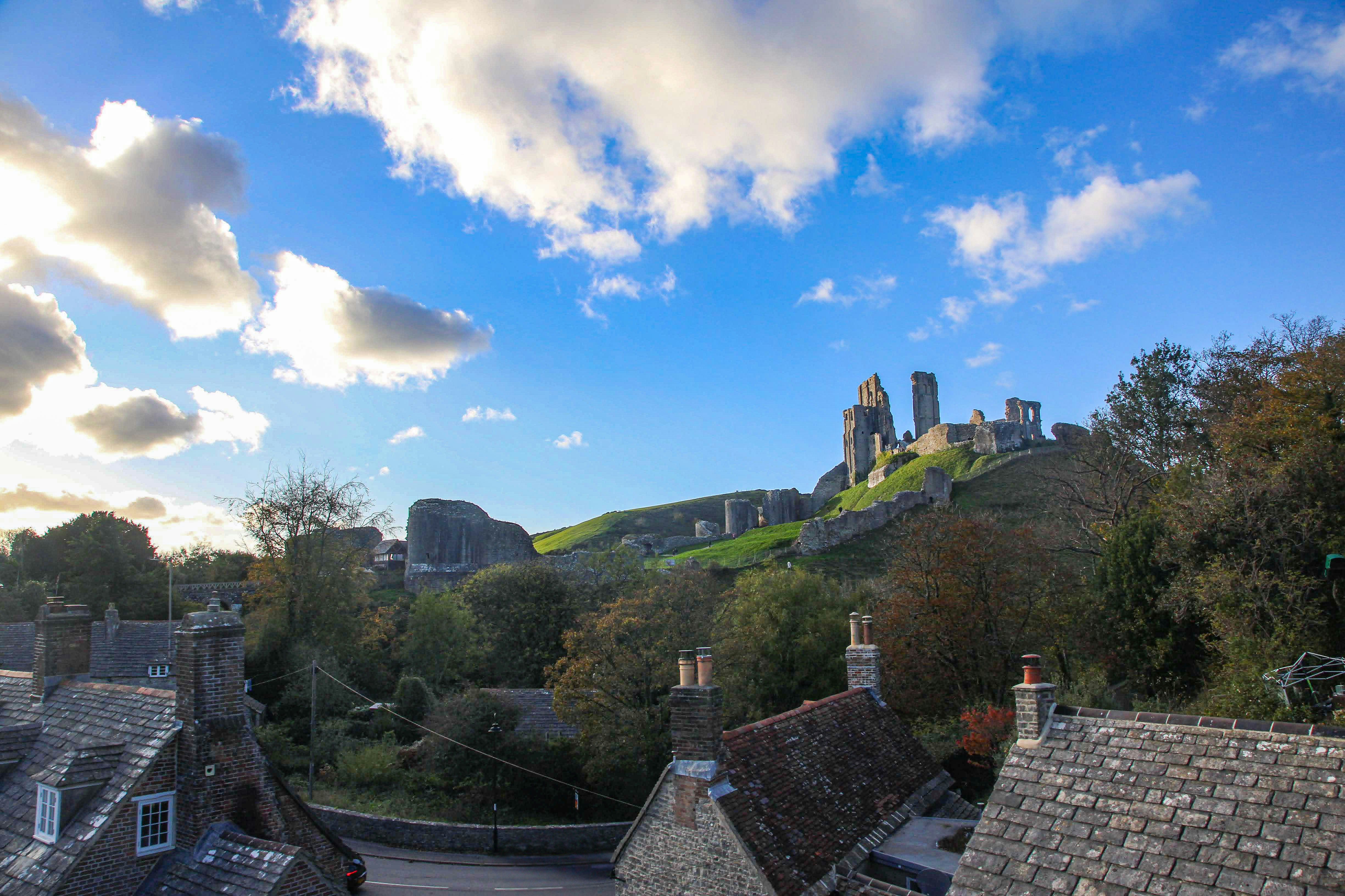 Ruins on the Hill: Stone Castles Overlook the Rooftops