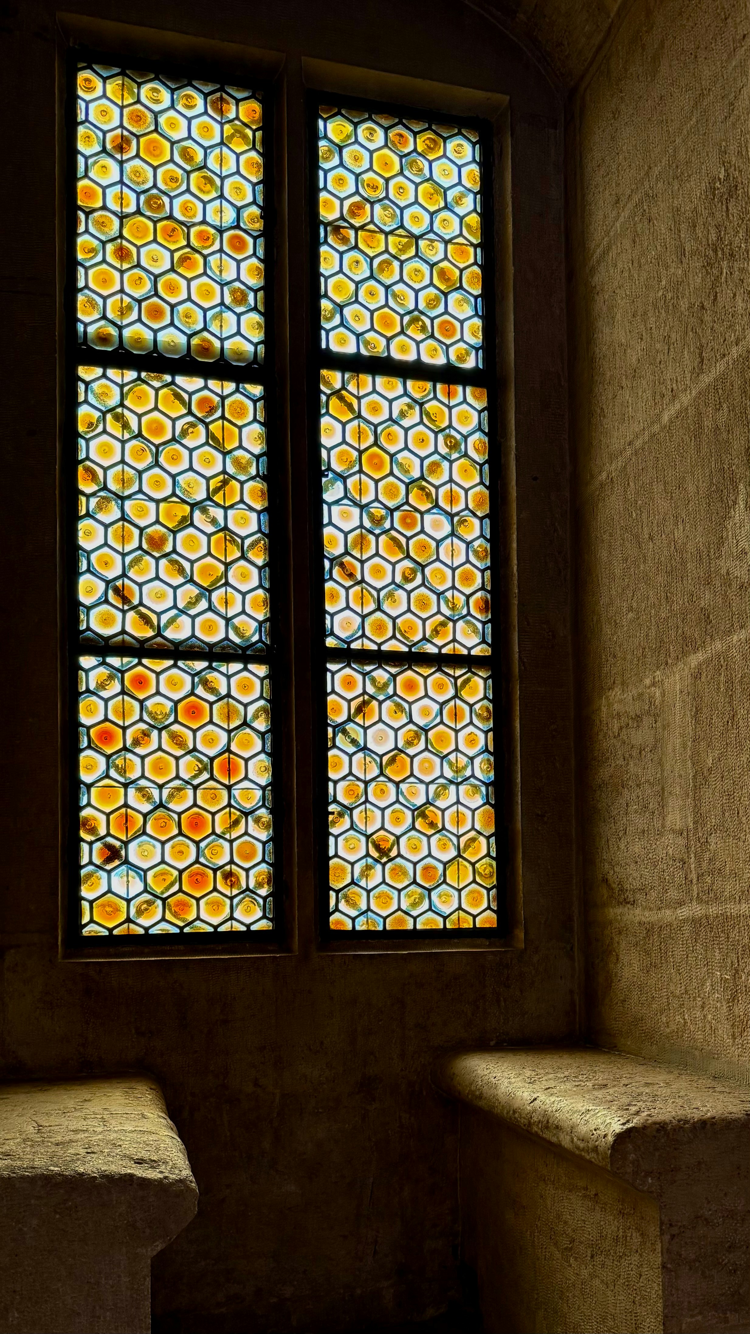 Hexagonal Light: Amber Honeycomb Window in Stone Nook