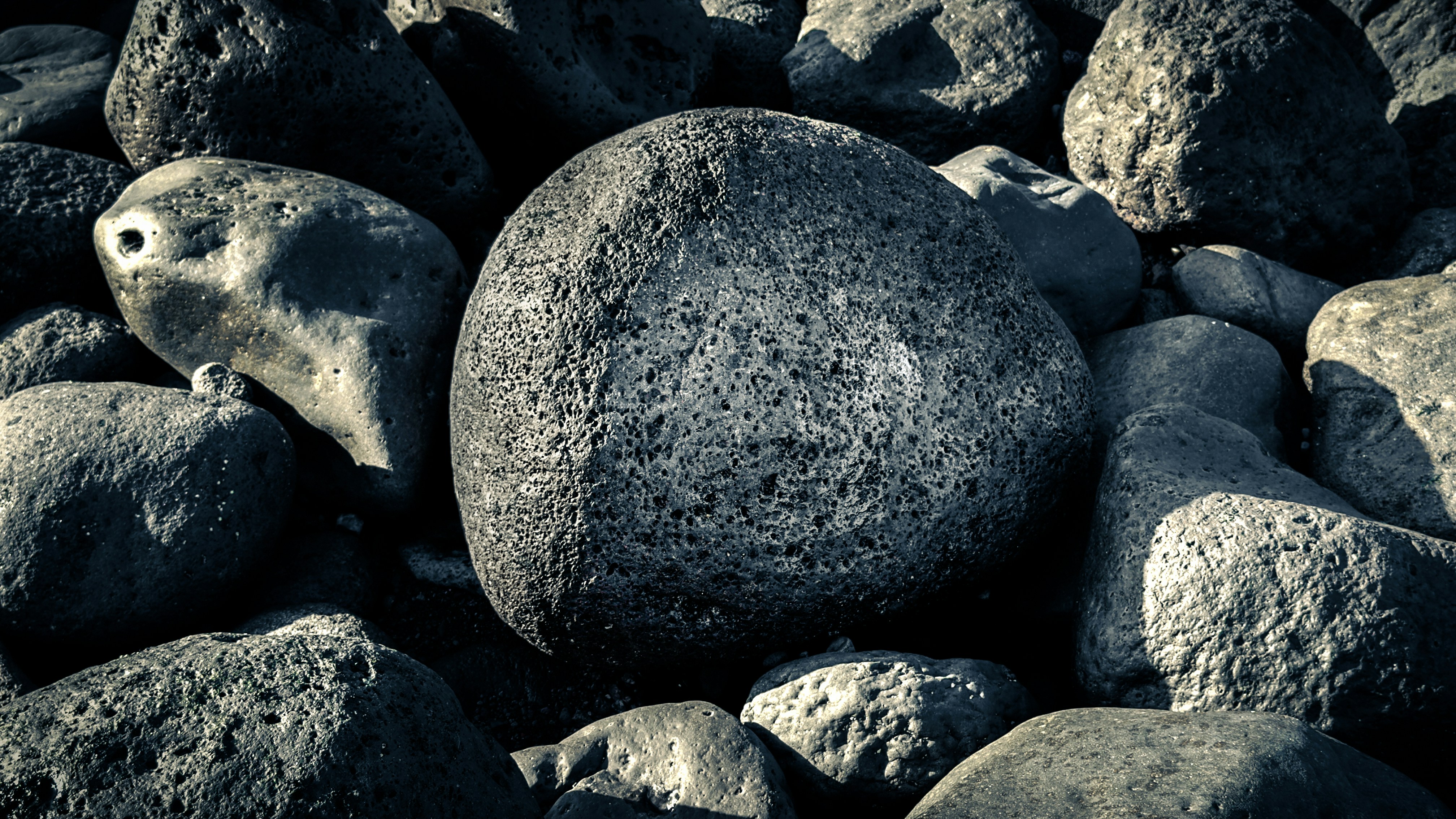 Pebble Portrait: A Quiet Shale Landscape on a Shimmering Shore