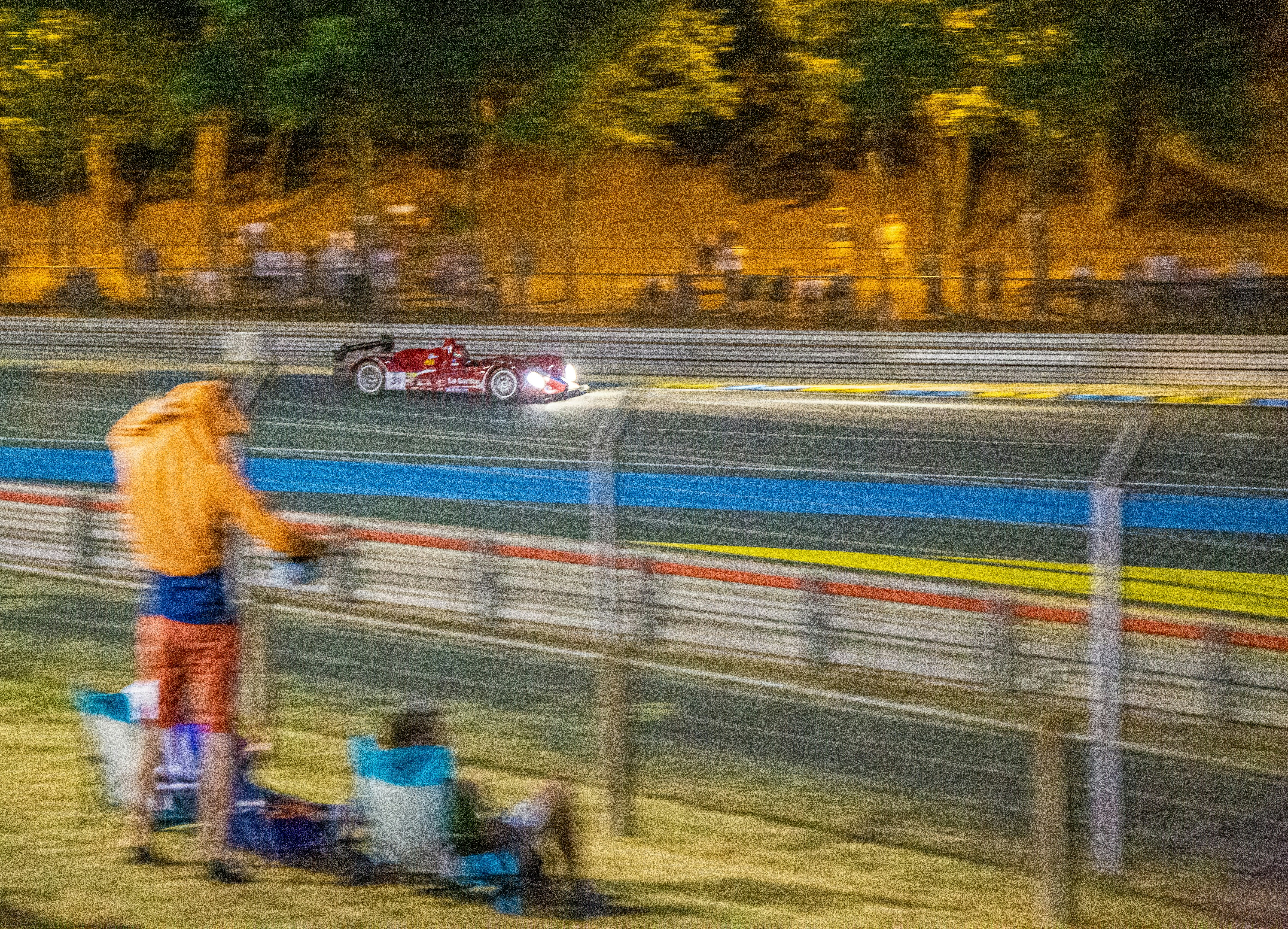 Rear-Engine Red: Night Sprint Along the Fence
