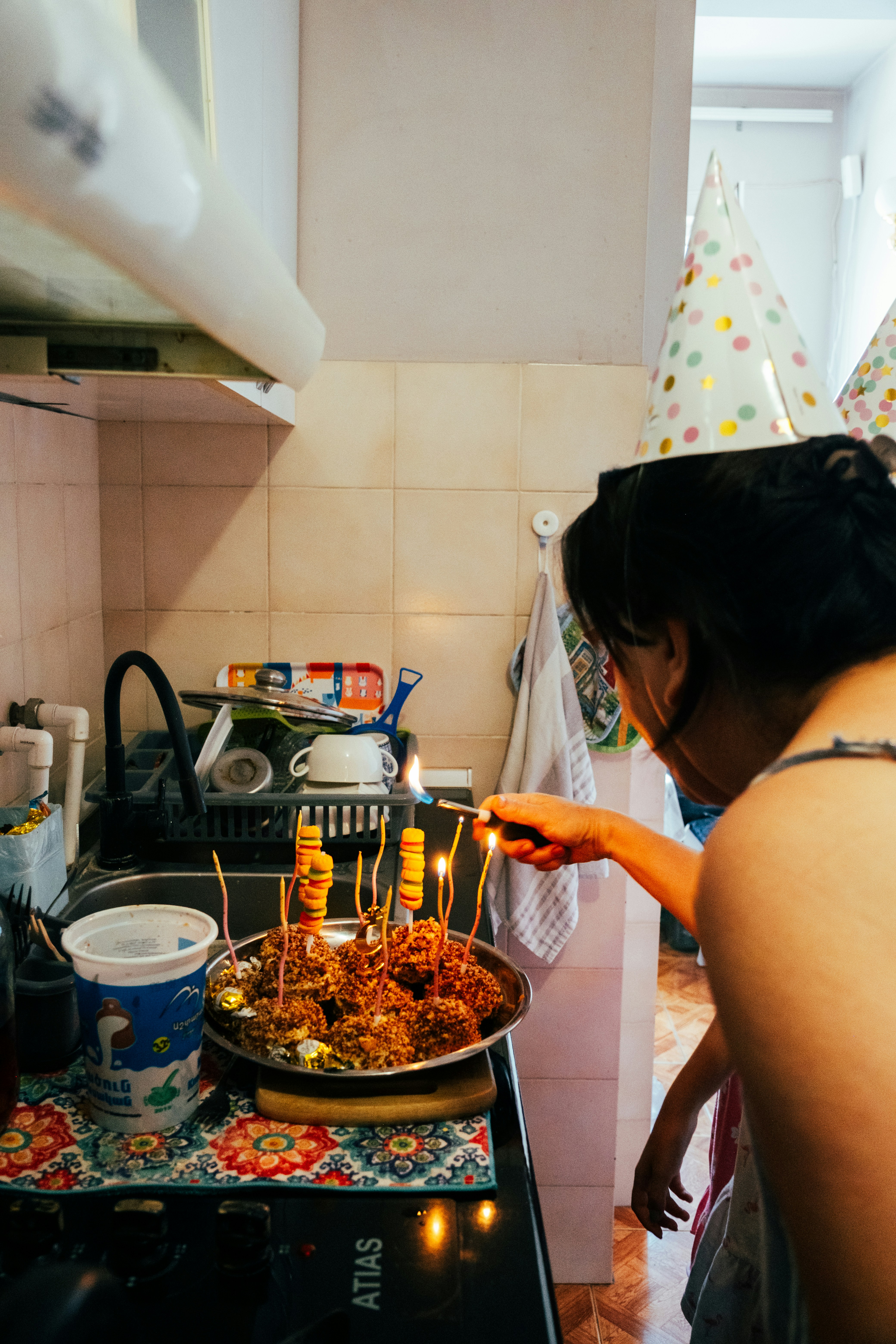 Birthday Blaze: A playful kitchen moment with a candle-lit skewered treat