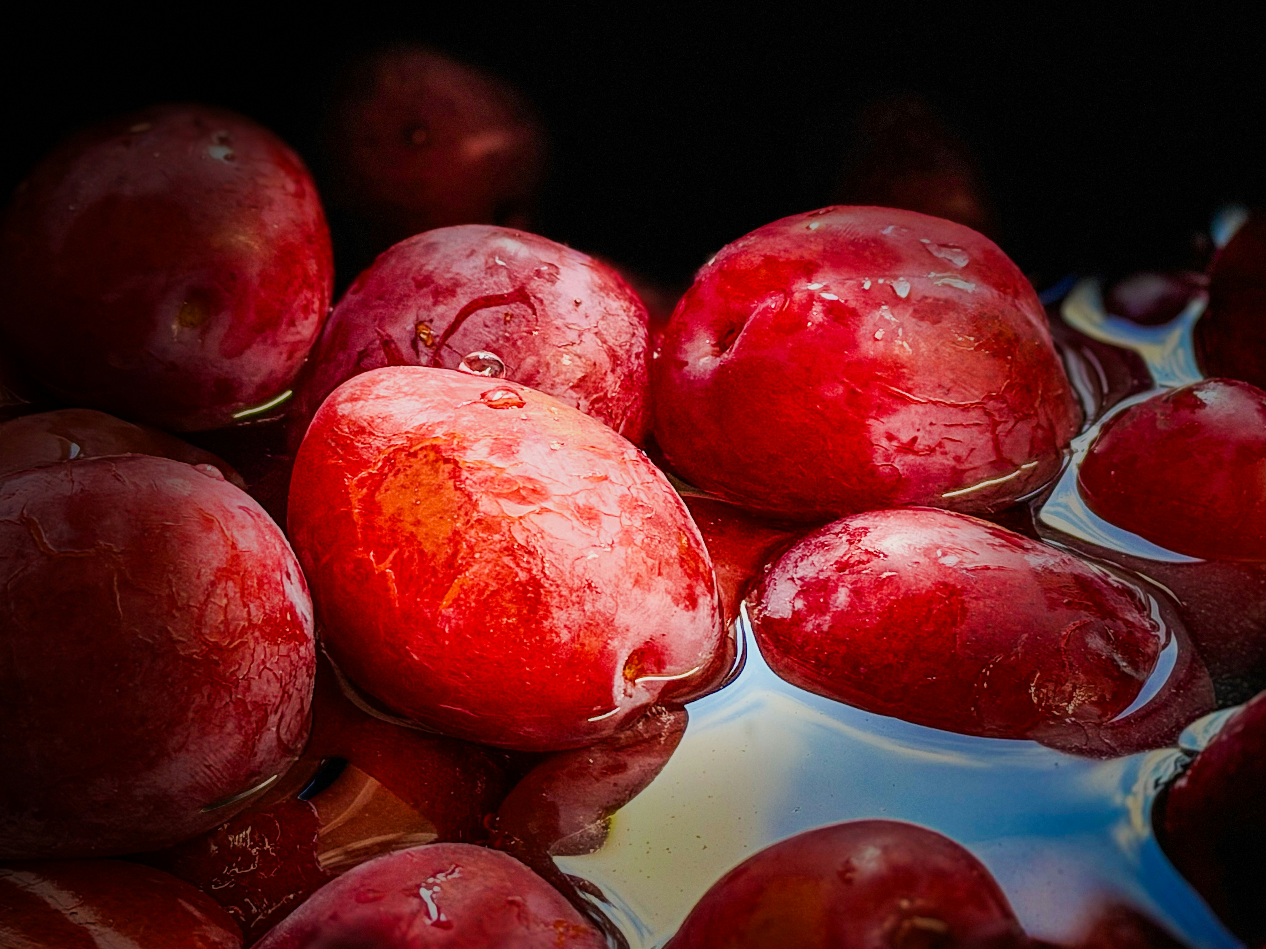 Juicy Red Orbs in Quiet Liquid Echoes