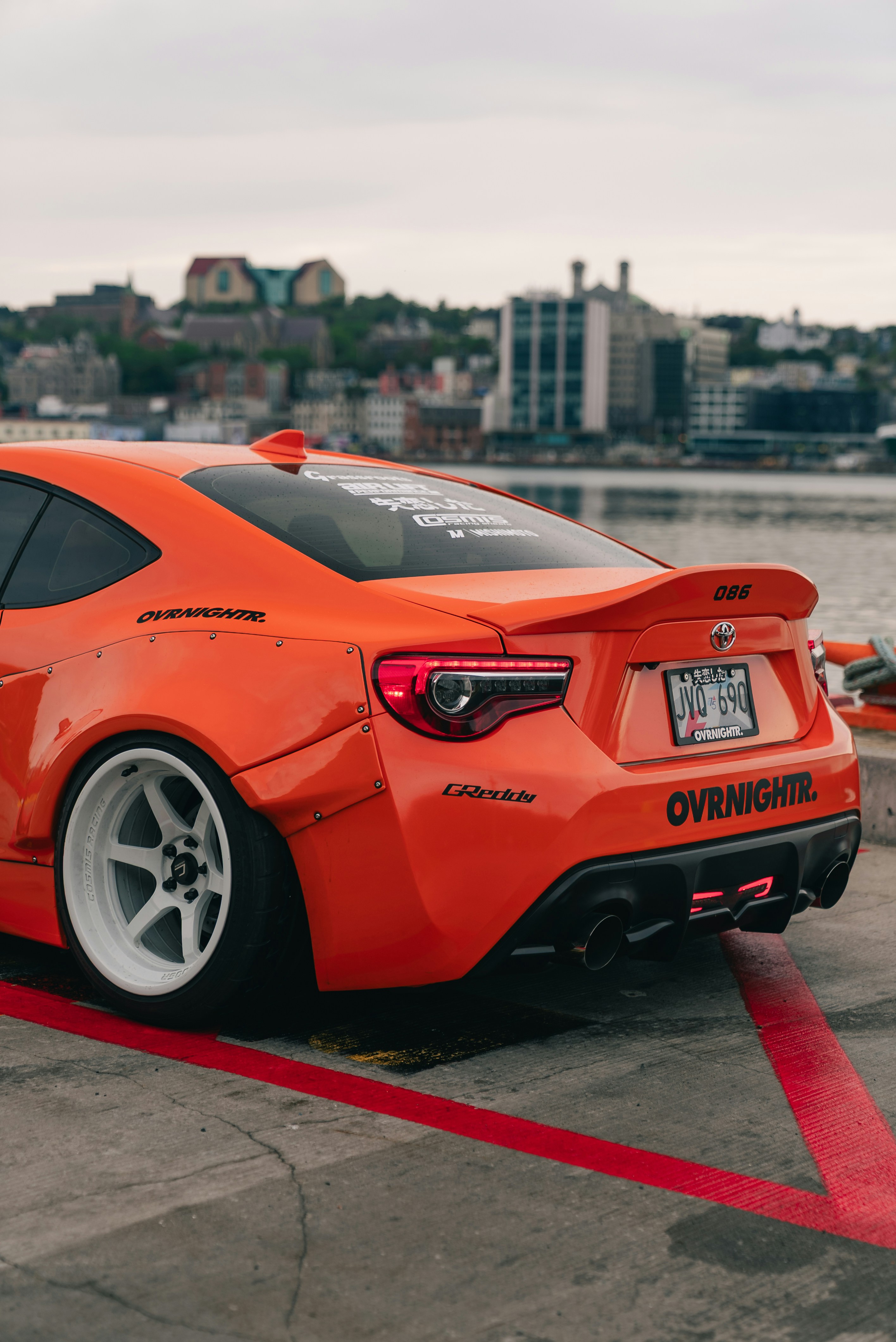 Burnt Orange Skyline: A Stance of Stolen Quiet on the Waterfront