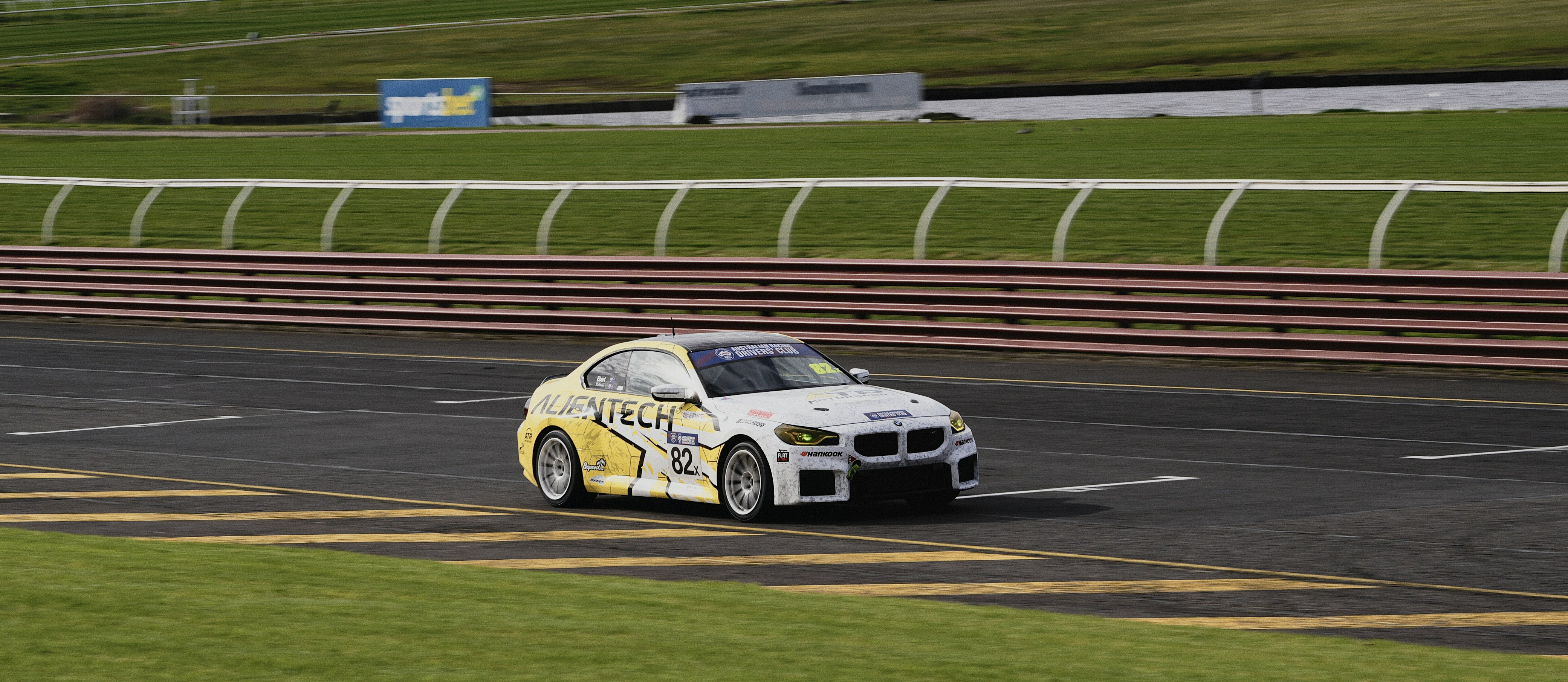 Sprint on the Strip: Yellow Racing Car Conquers the Curve