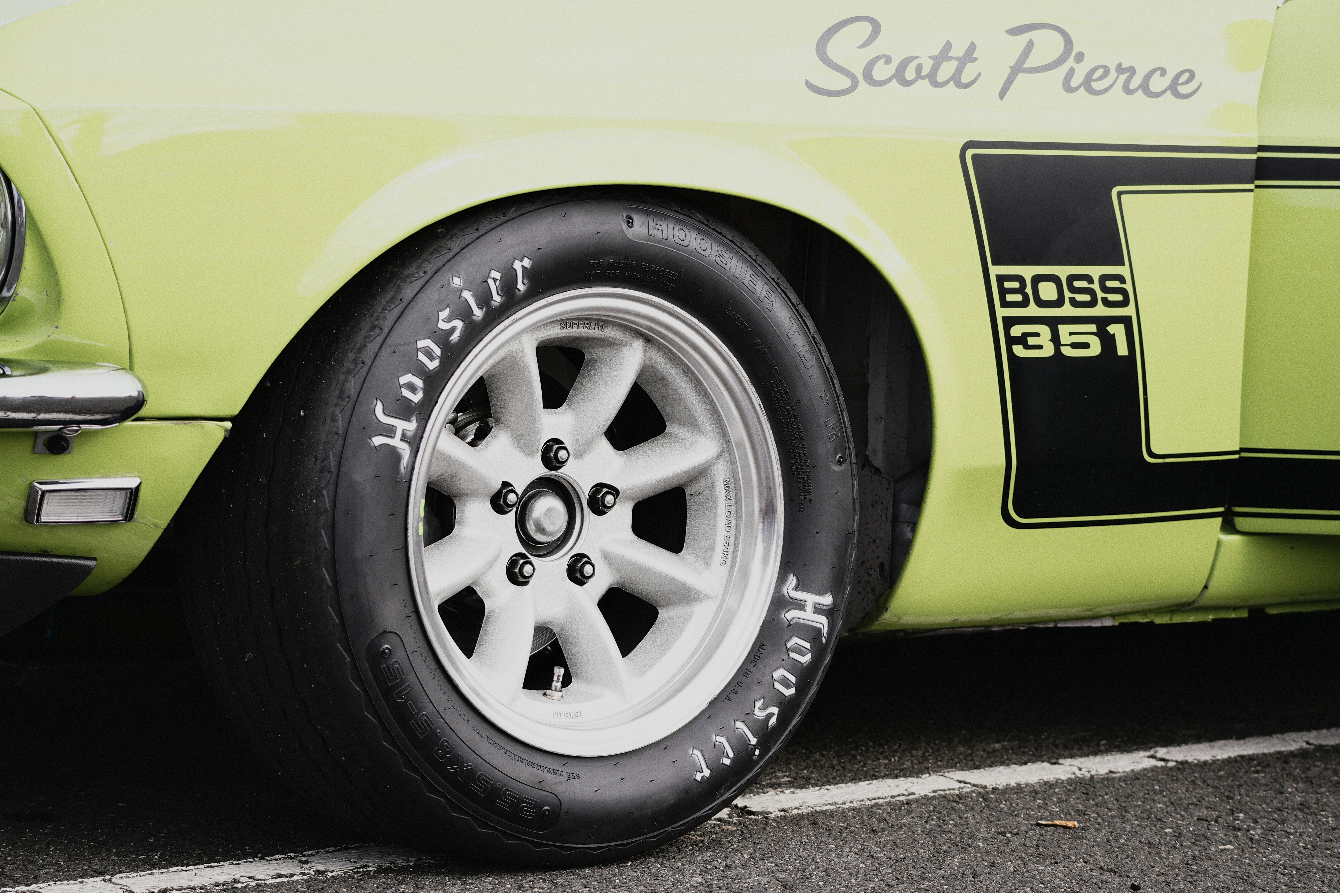 Green Thunder: classic race car profile and tire detail