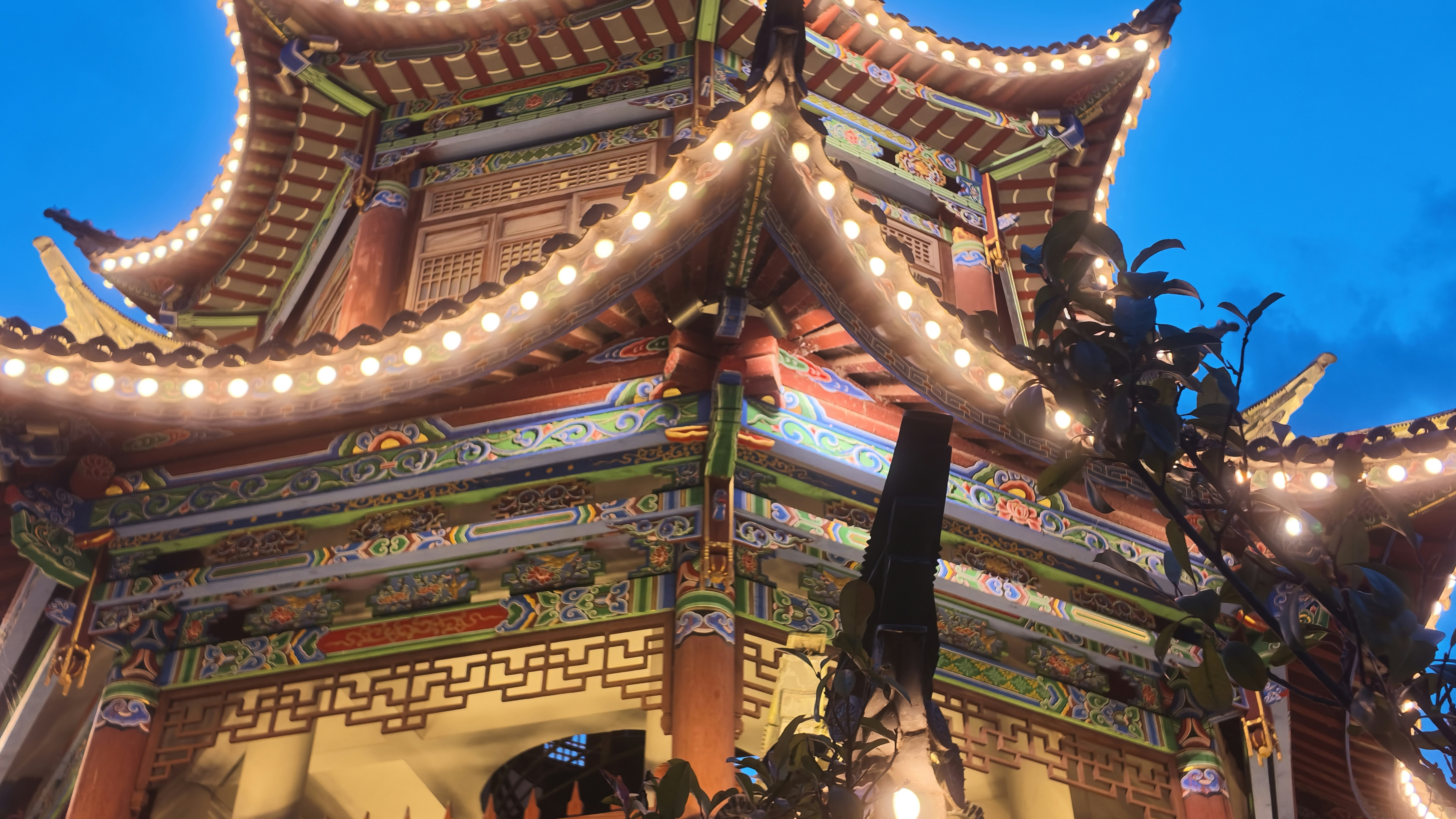 Amber-lit Pagoda: a lantern-woven triumph at dusk