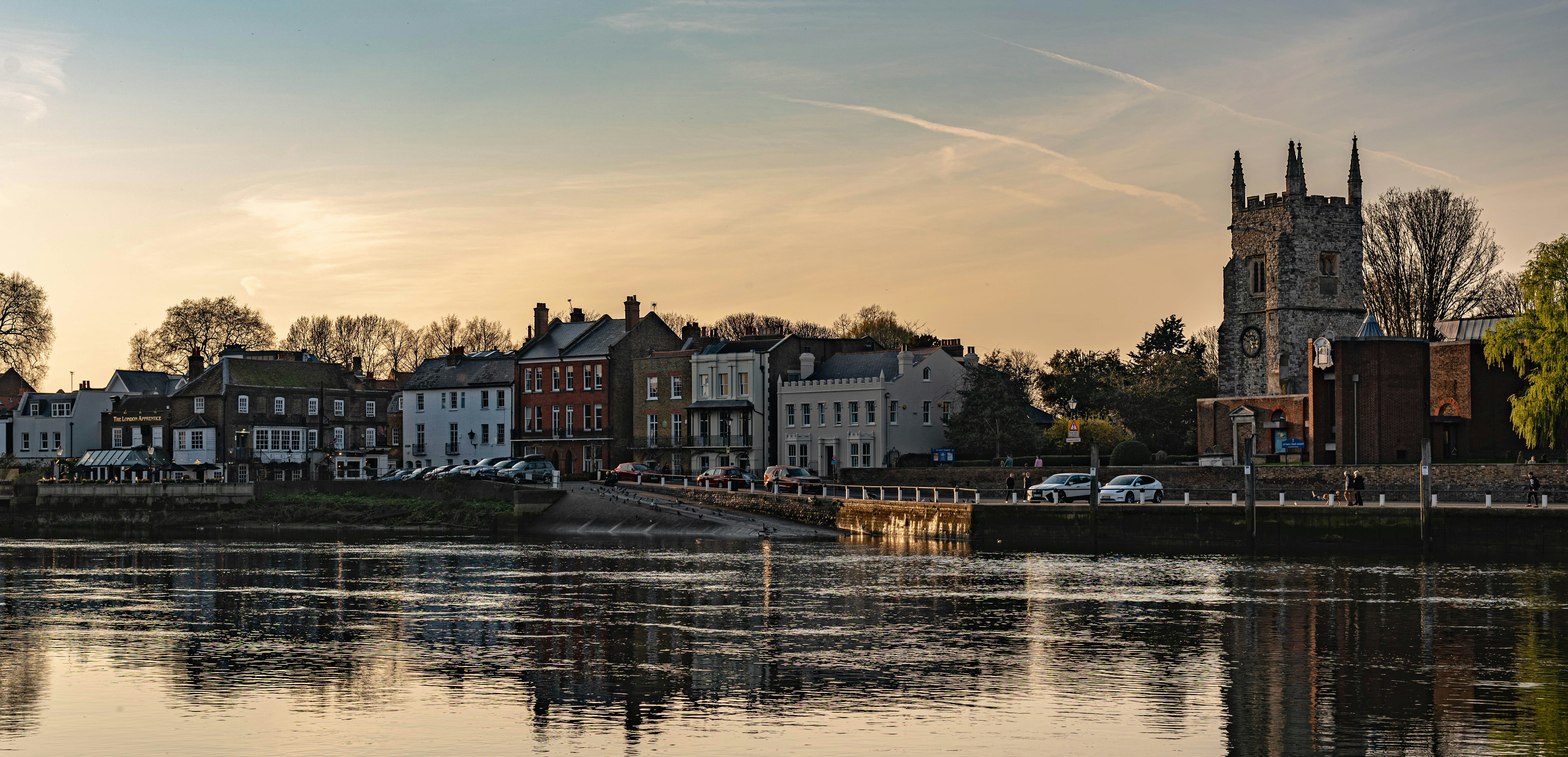 Harbor Village at Dusk: The Church Steeple and Riverside