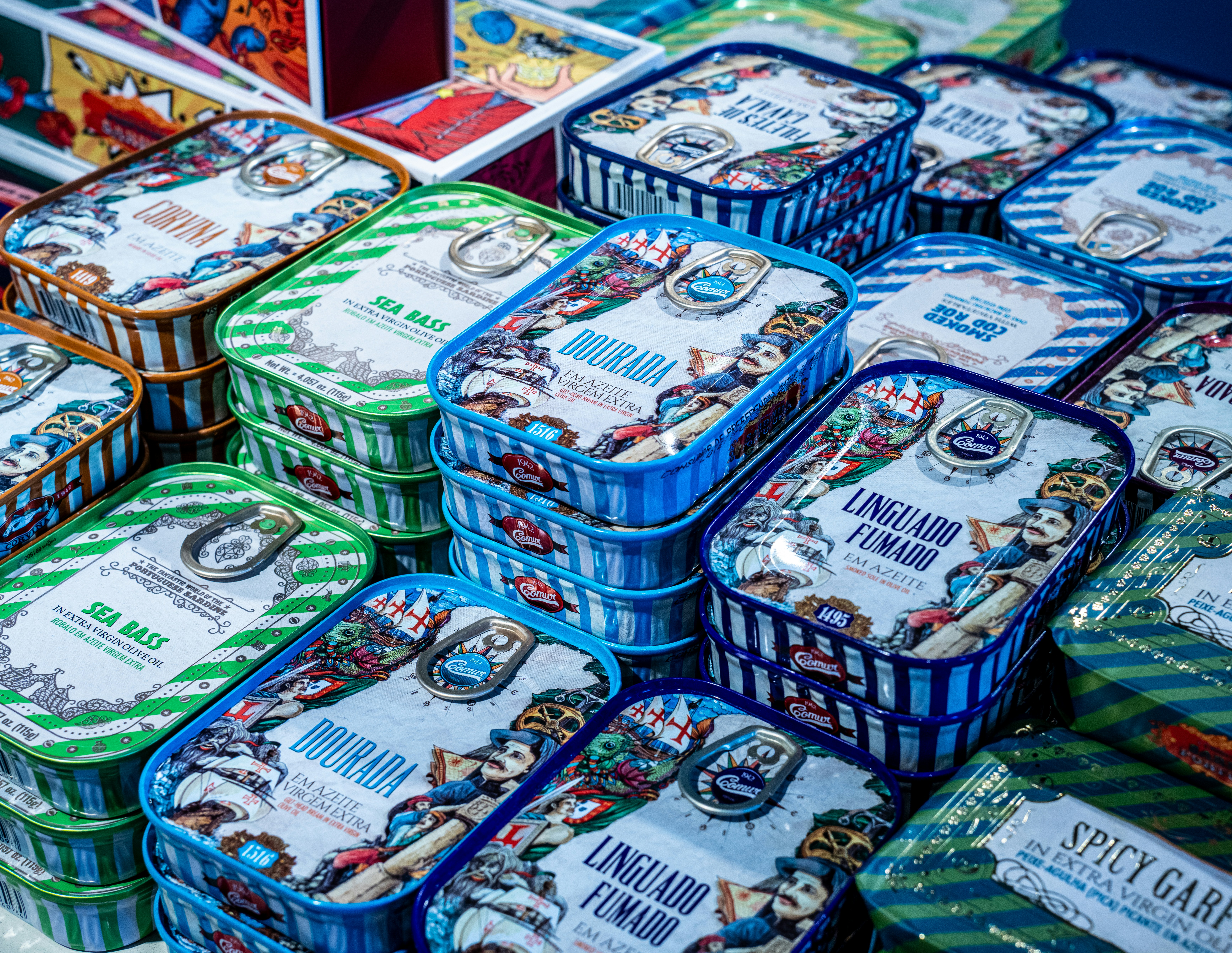Colorful Tin Can Terrains: A Market Stack of Snack Tidbits