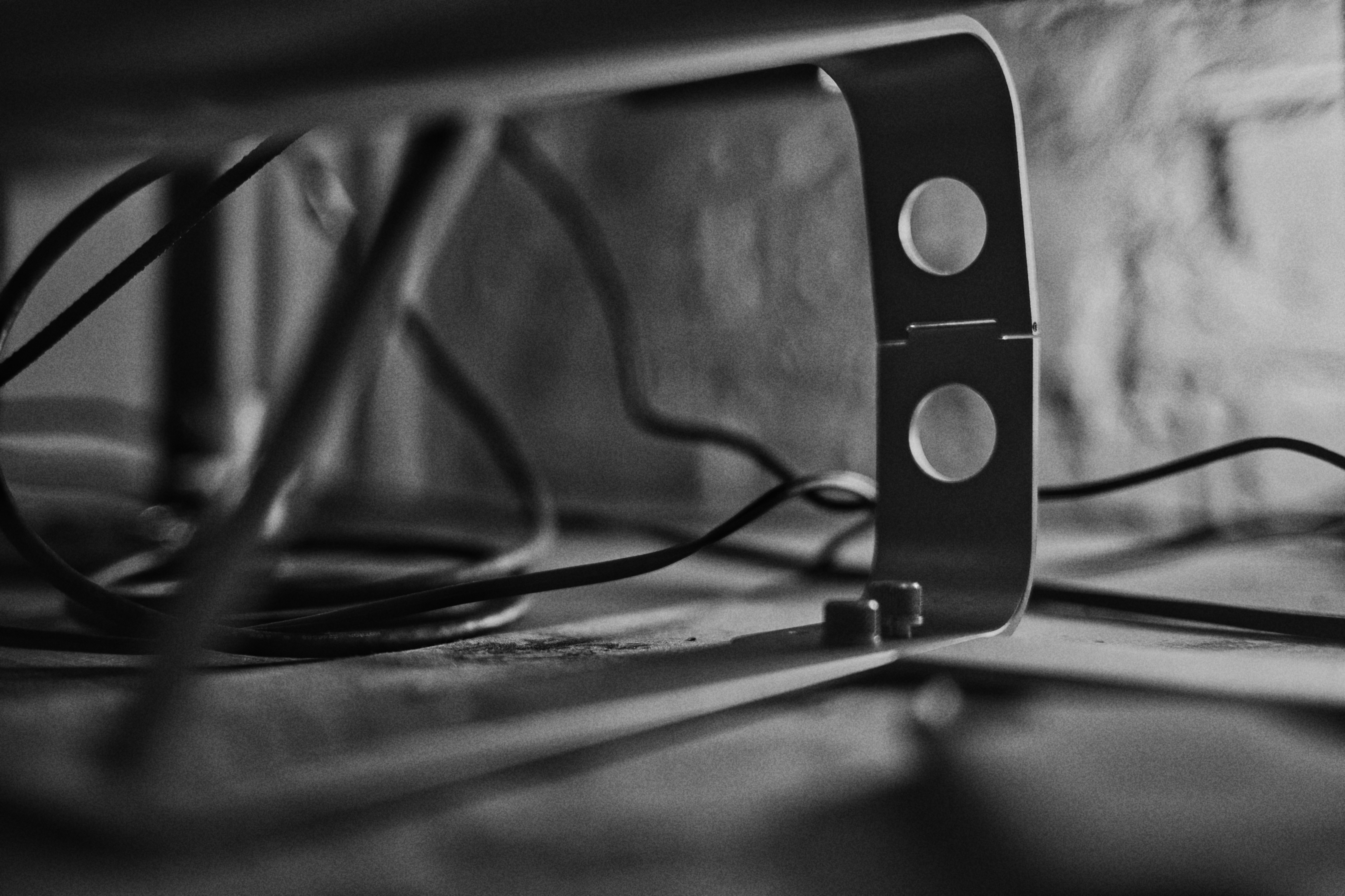 Nervous Tension in a Tangled Studio Scene: A Close-Up of Cables and Bracket