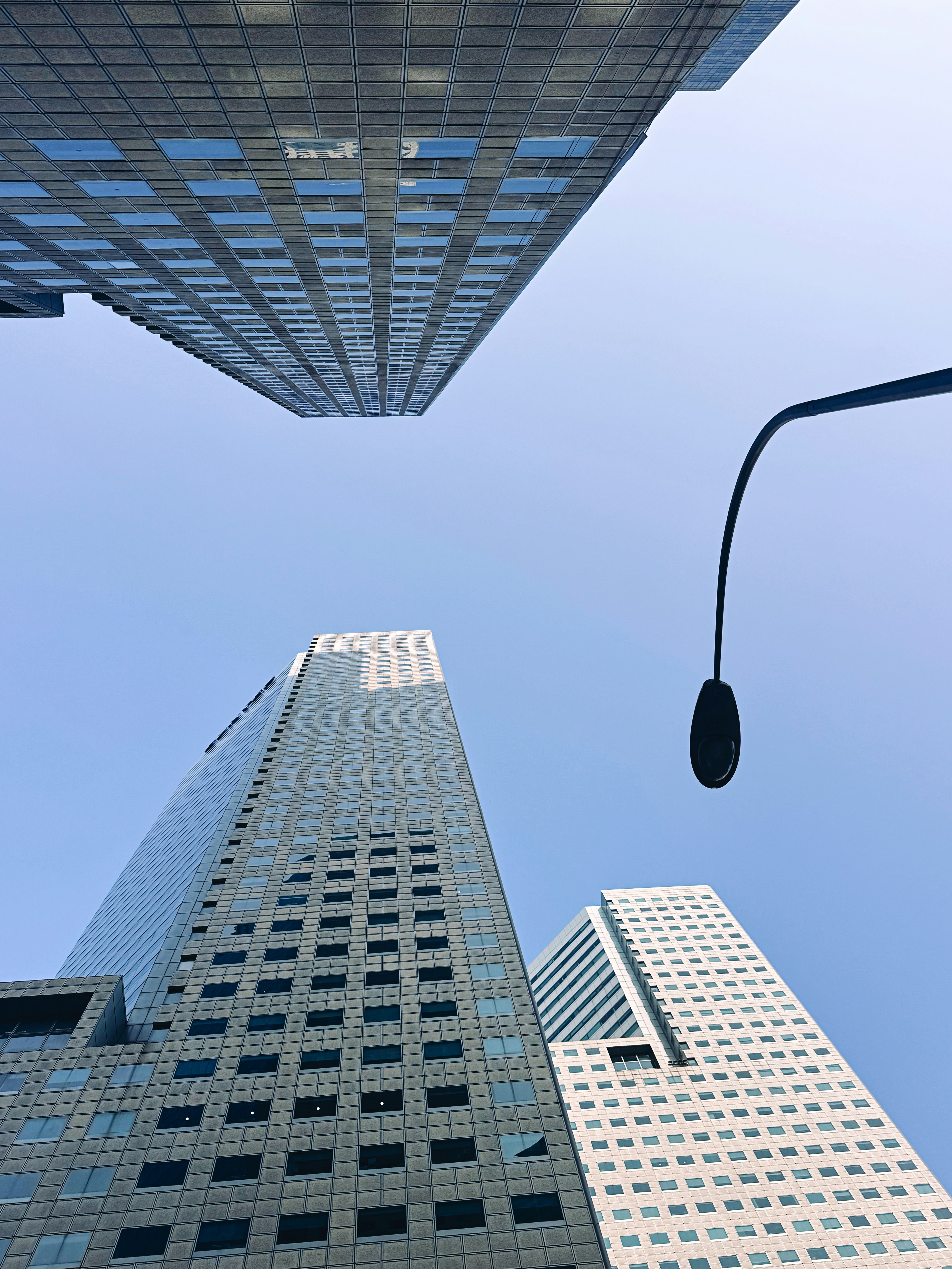 Vertical Vistas: A Skyward Alley of Towers