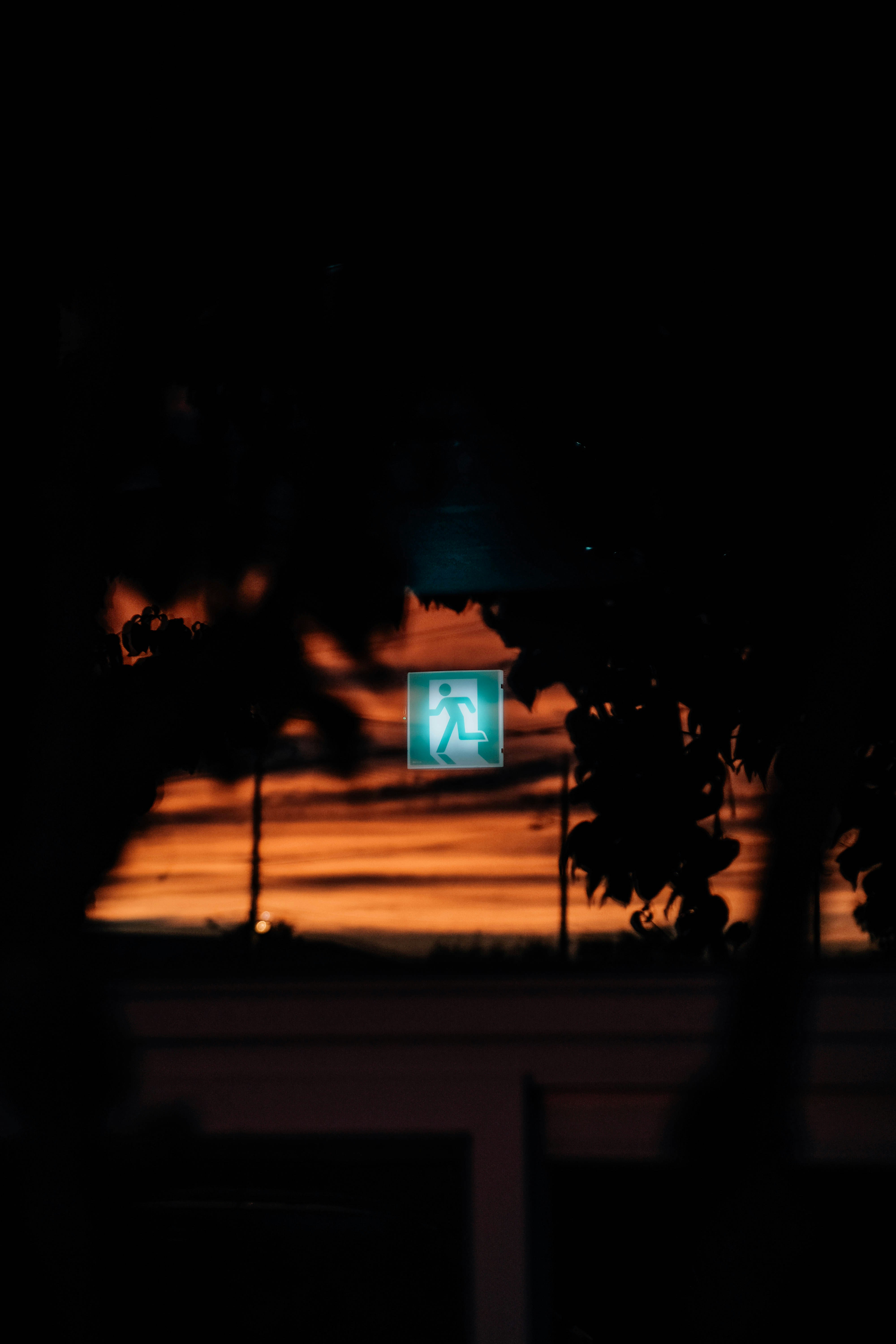 Emergent Exit: LED Runway Sign Against Dusk
