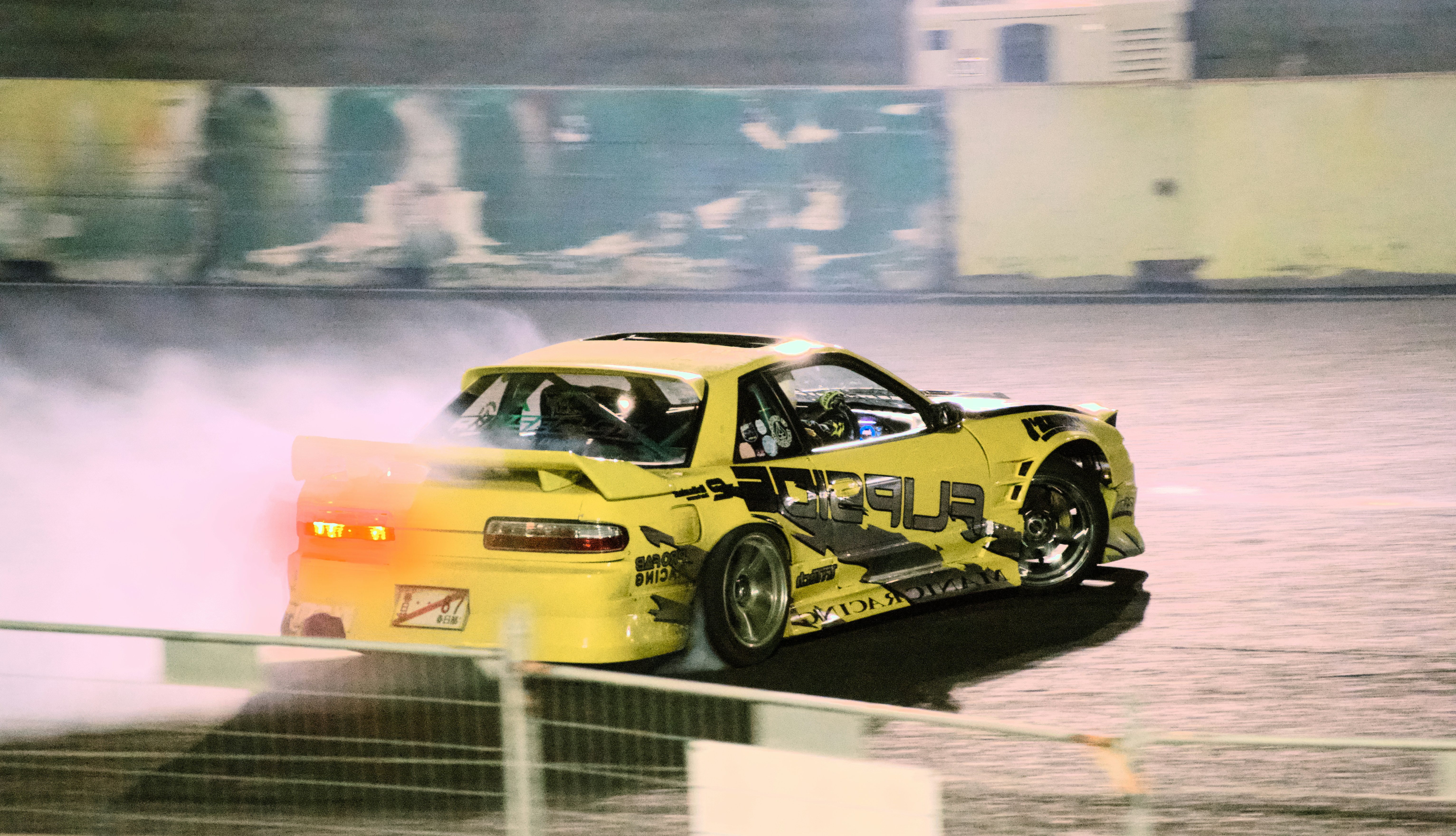 Yellow Drift: A Neon Blaze Rounds the Track