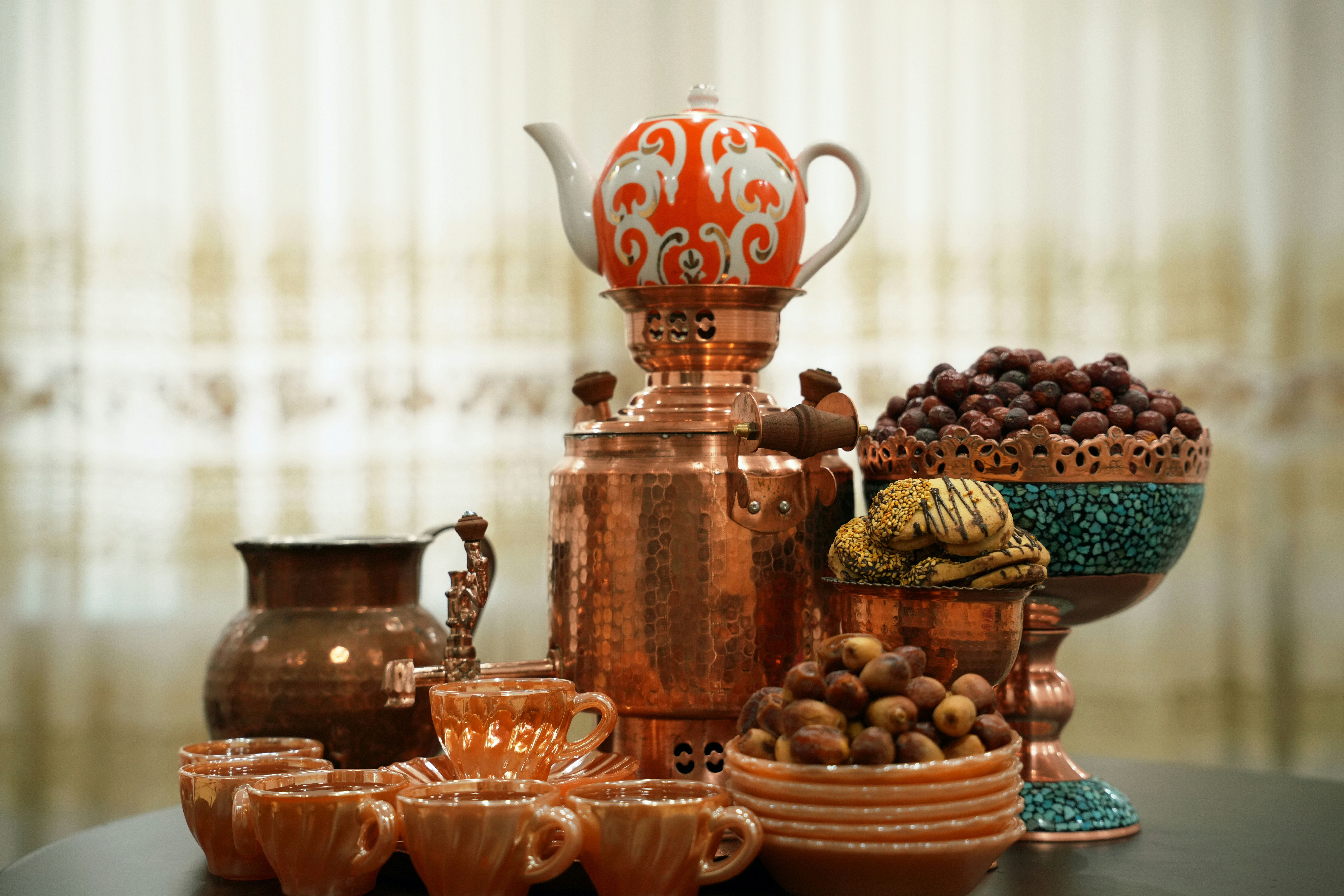 Copper Crest: A Still Life of Teapot and Treats