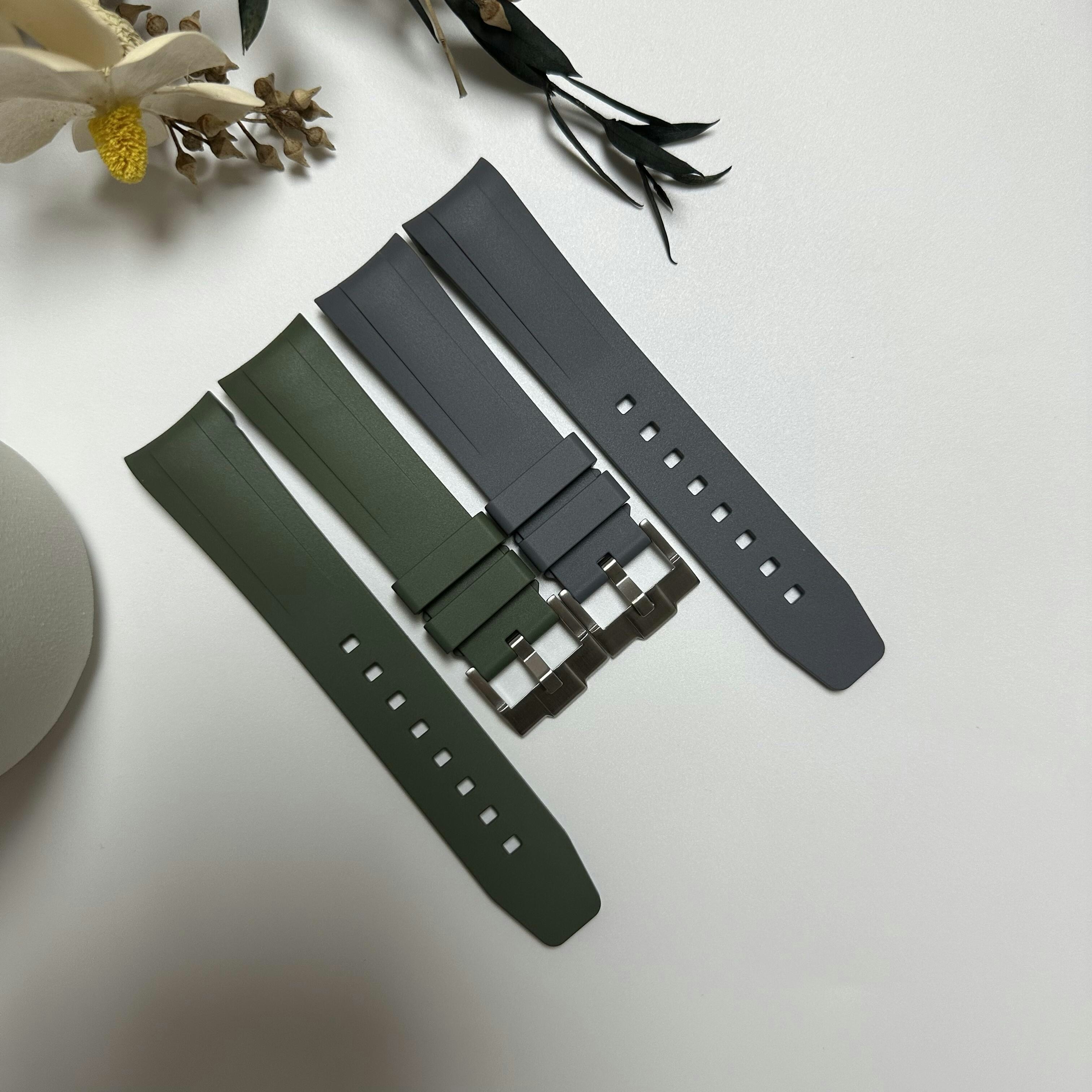 Green and Gray Watch Straps Arrange for a Minimalist Flat-Lay
