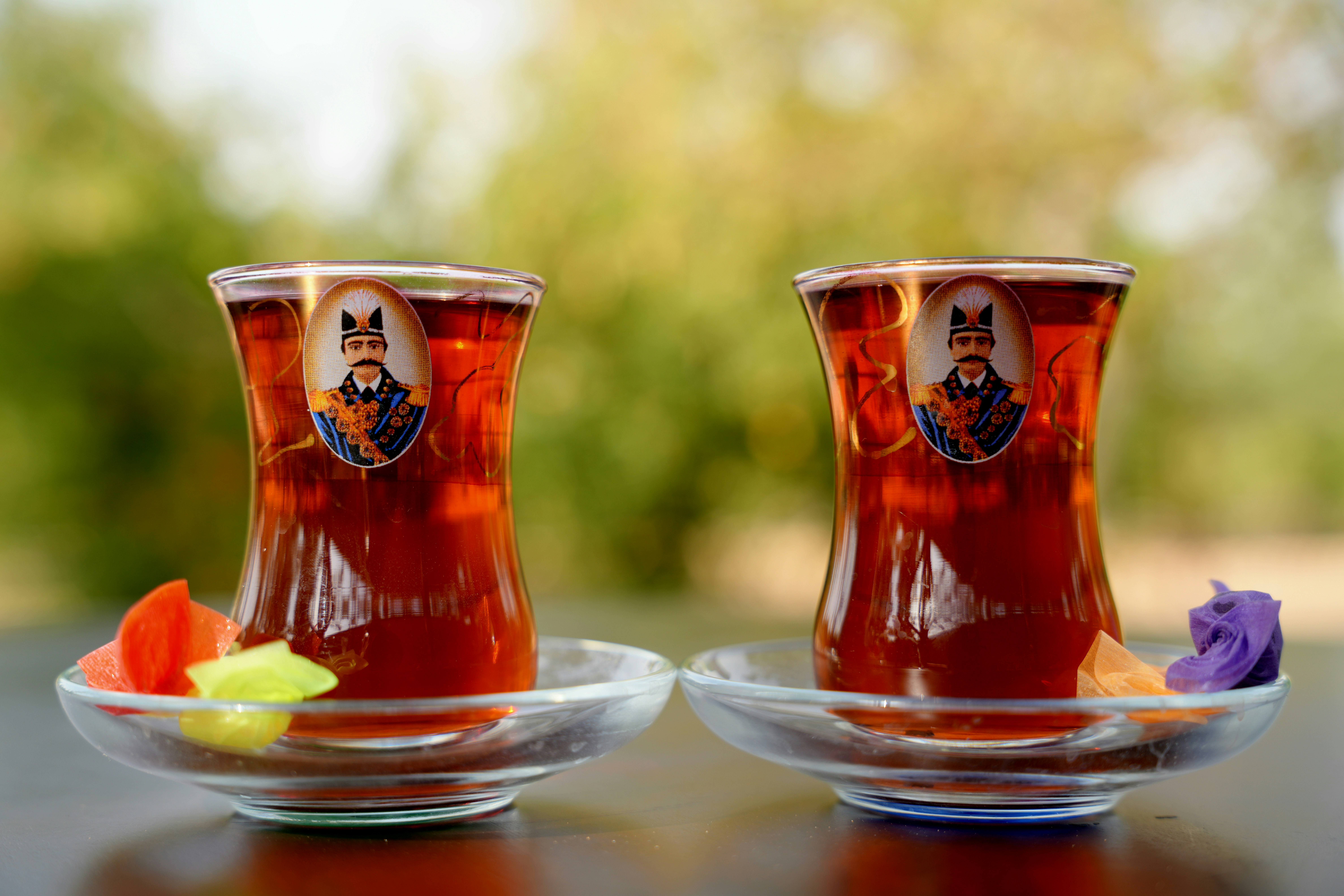 Twin Turkish Tea Glasses: Peppered with Color on a Sunny Table