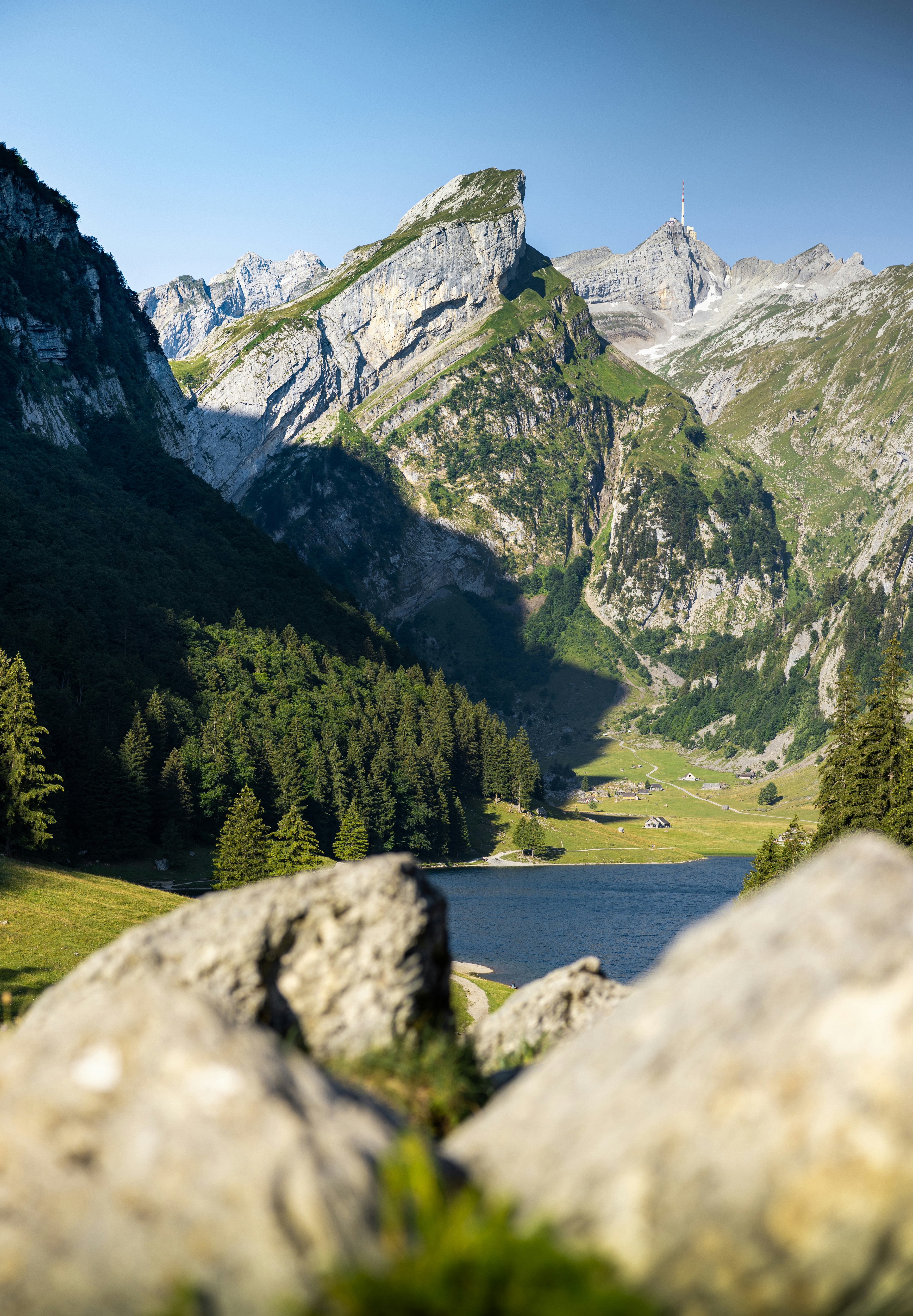 Alpine Crown: A Sharp Peak Overlooking a Serene Valley