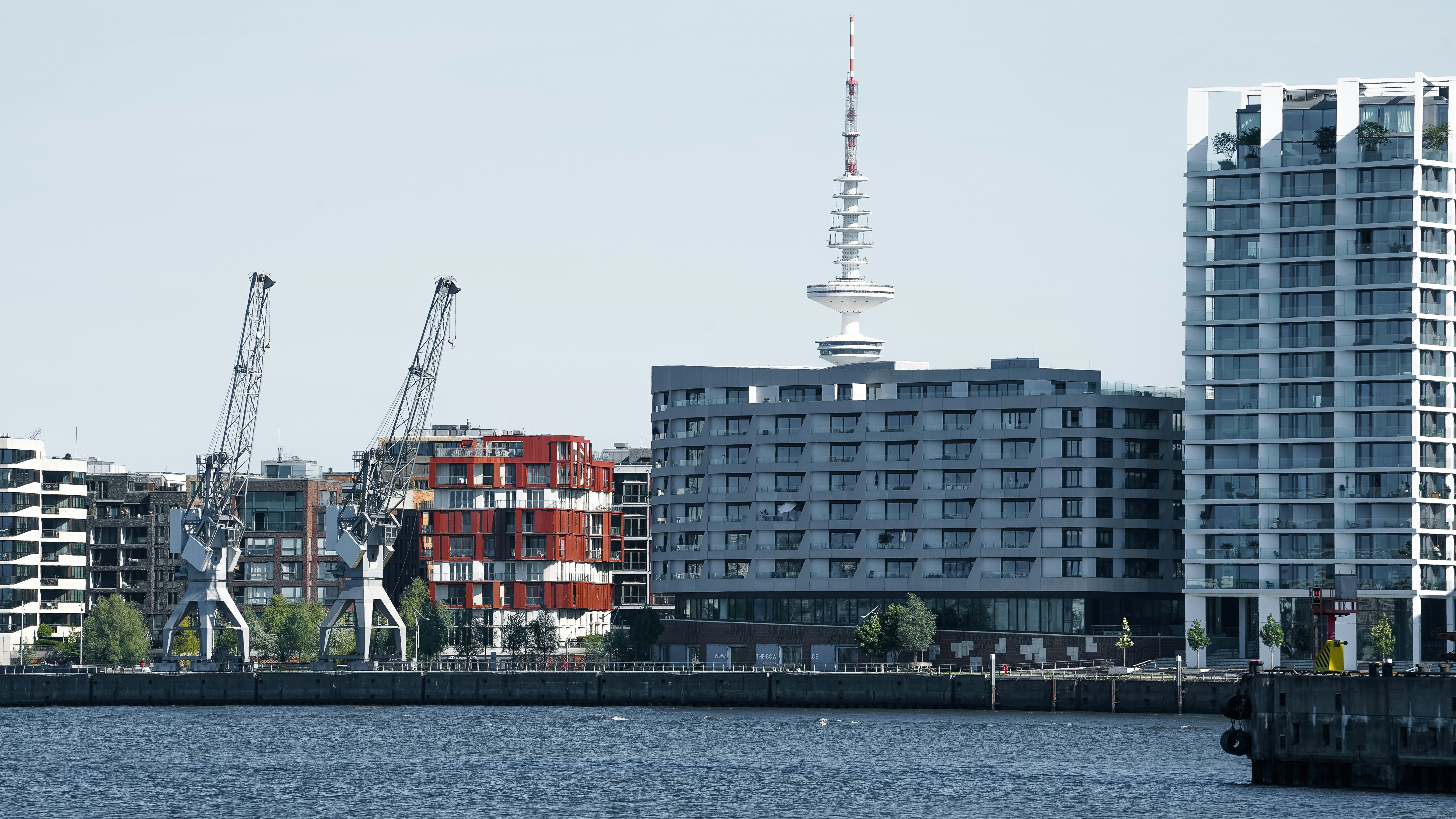 Harbor Skyline with Cranes and Tower Beacon