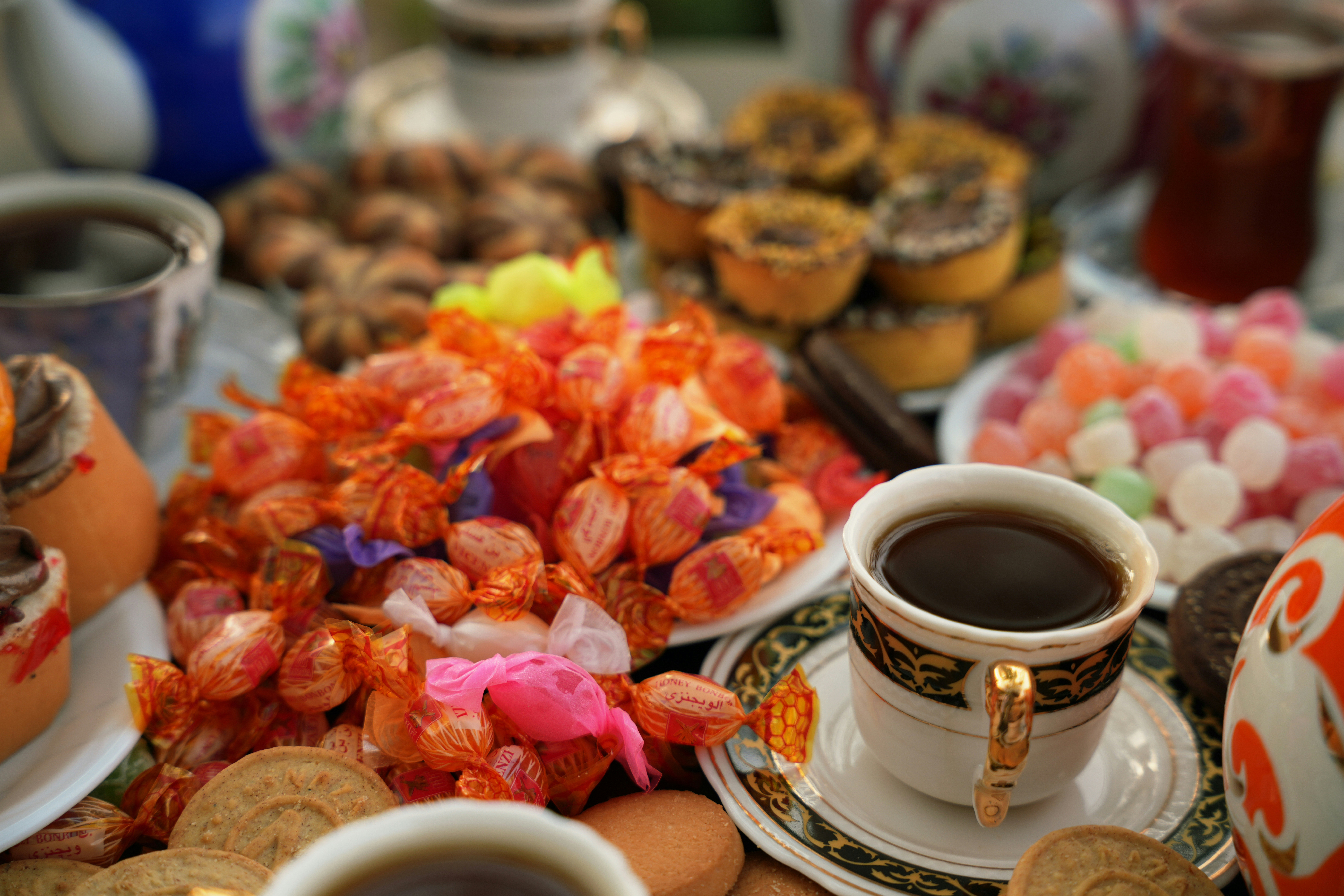 Lively Tea Service Amid Assorted Confections