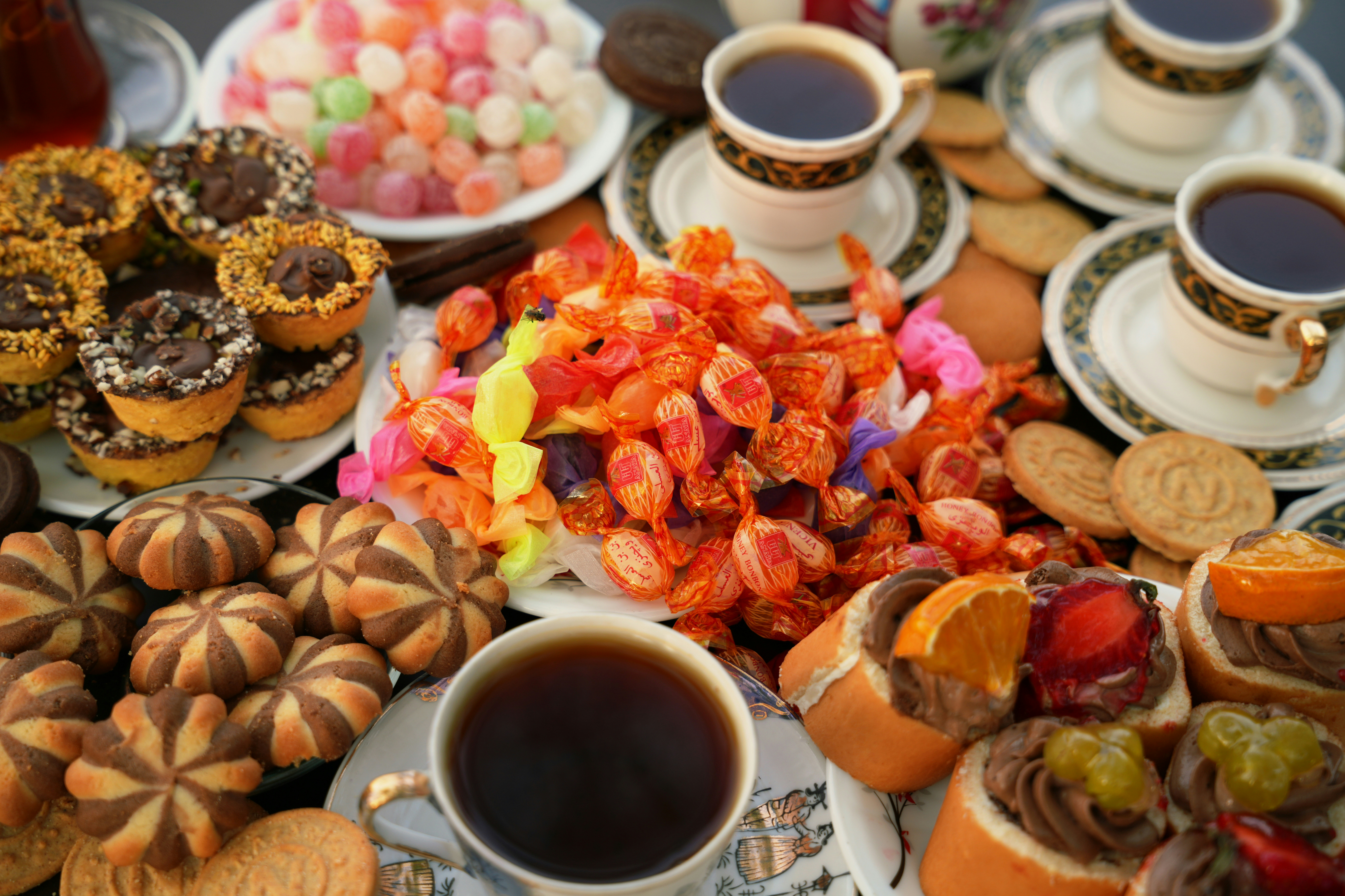 Around-the-Table Sweet Feast: A Colorful Confluence of Pastries and Coffee