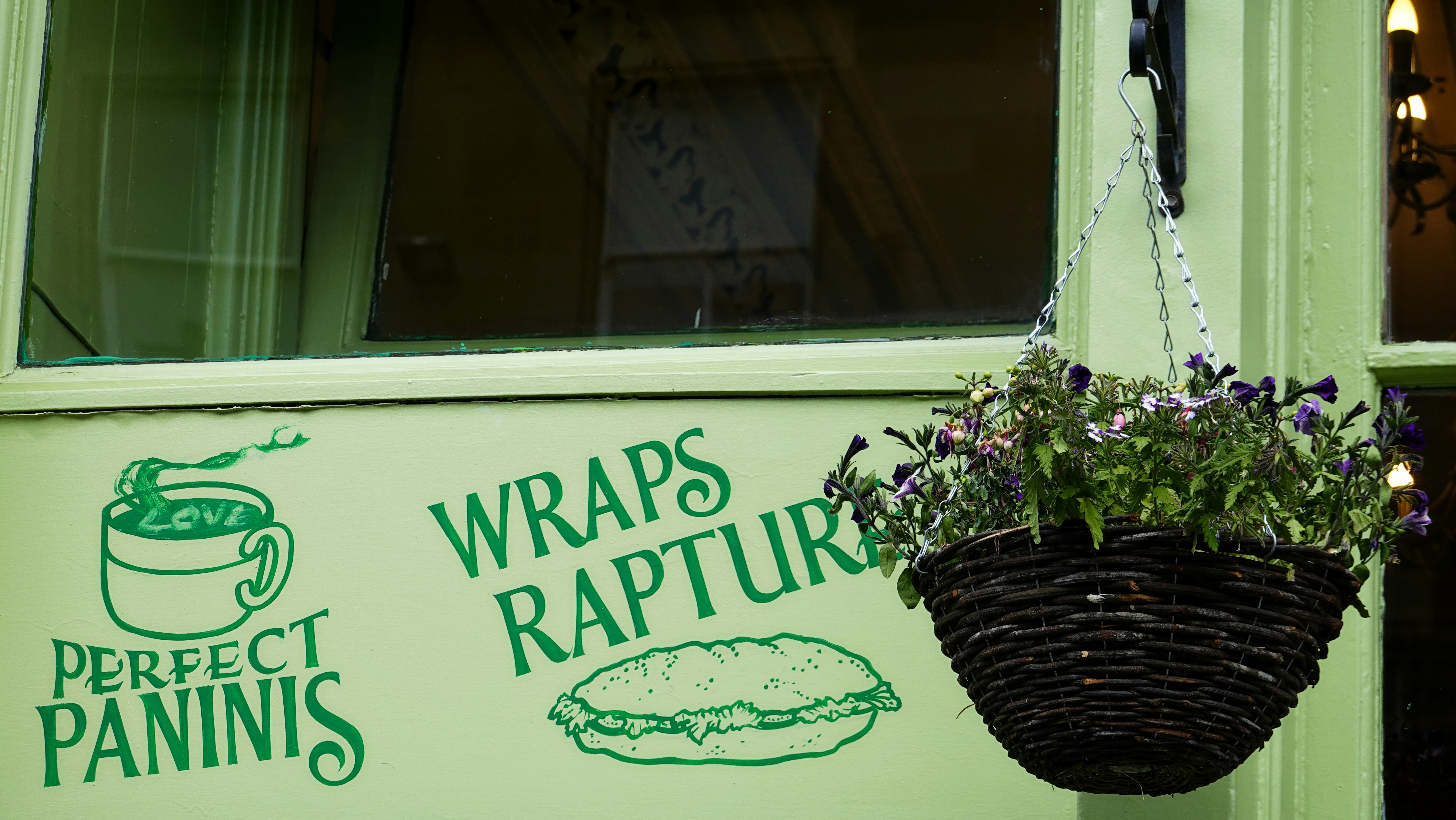 Wraps, Raptures, and a Green Window Sign