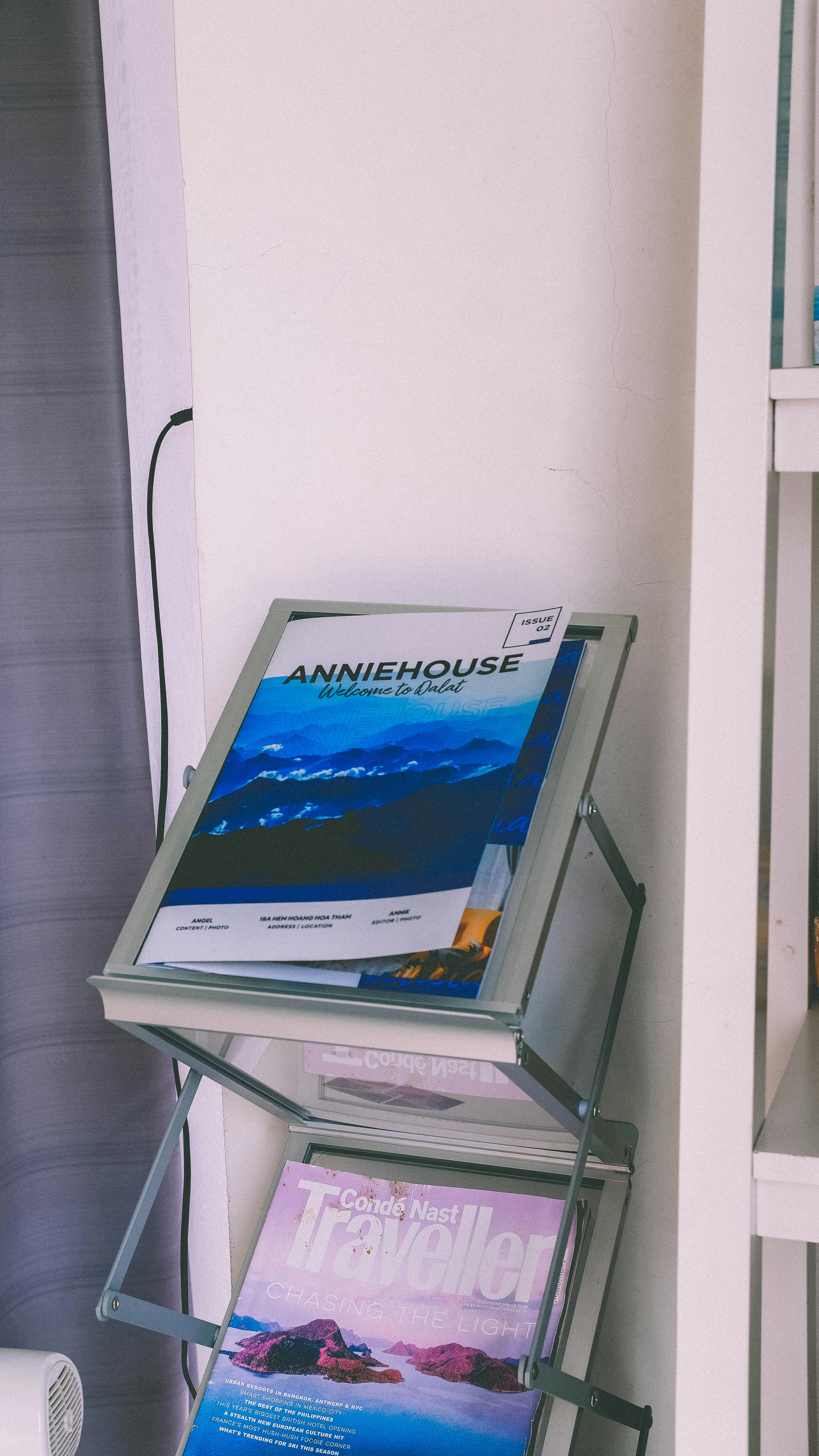 Travel Magazine Stand in a Quiet Indoor Corridor