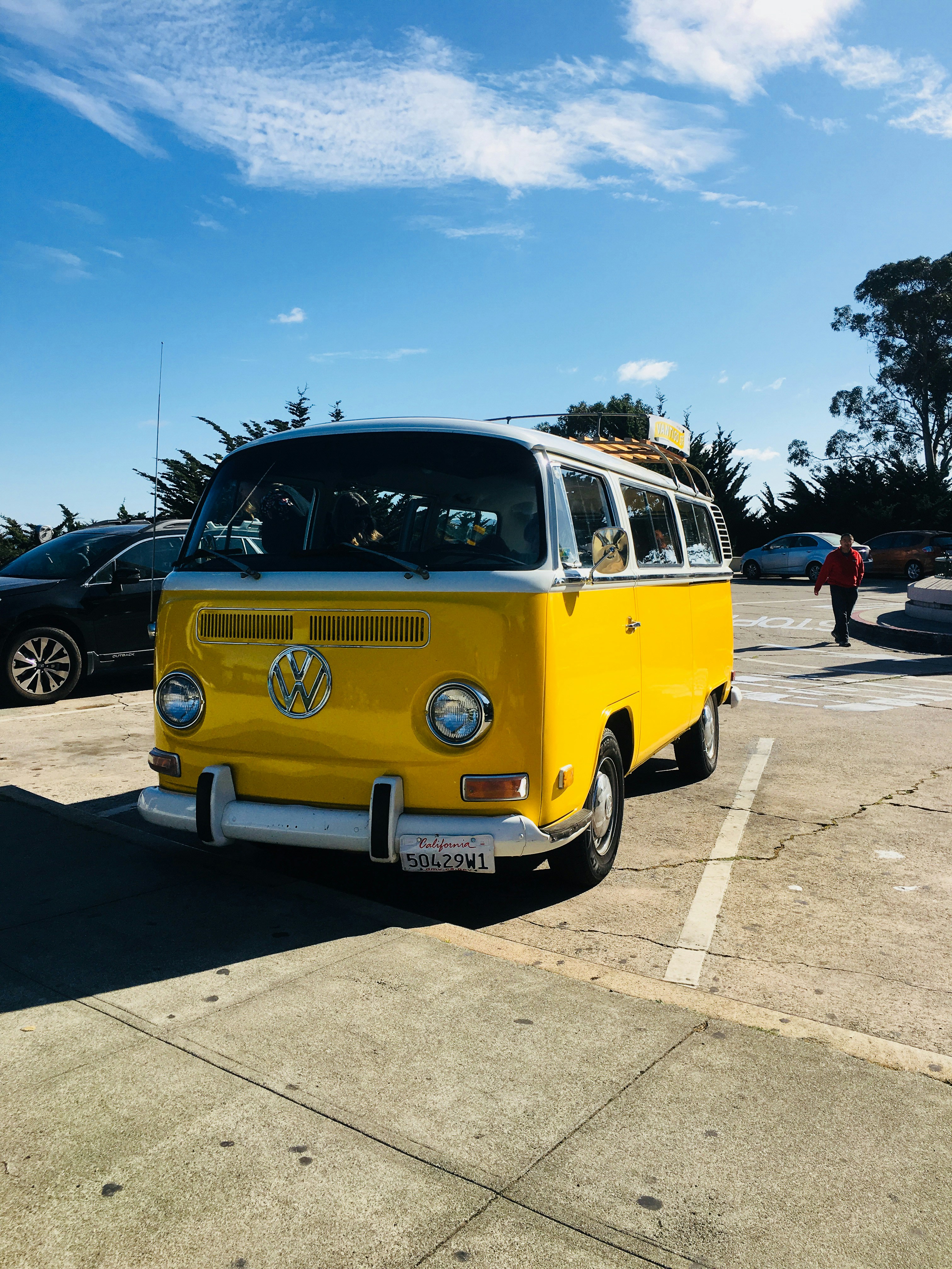 Yellow Campervan in the Parking Lot