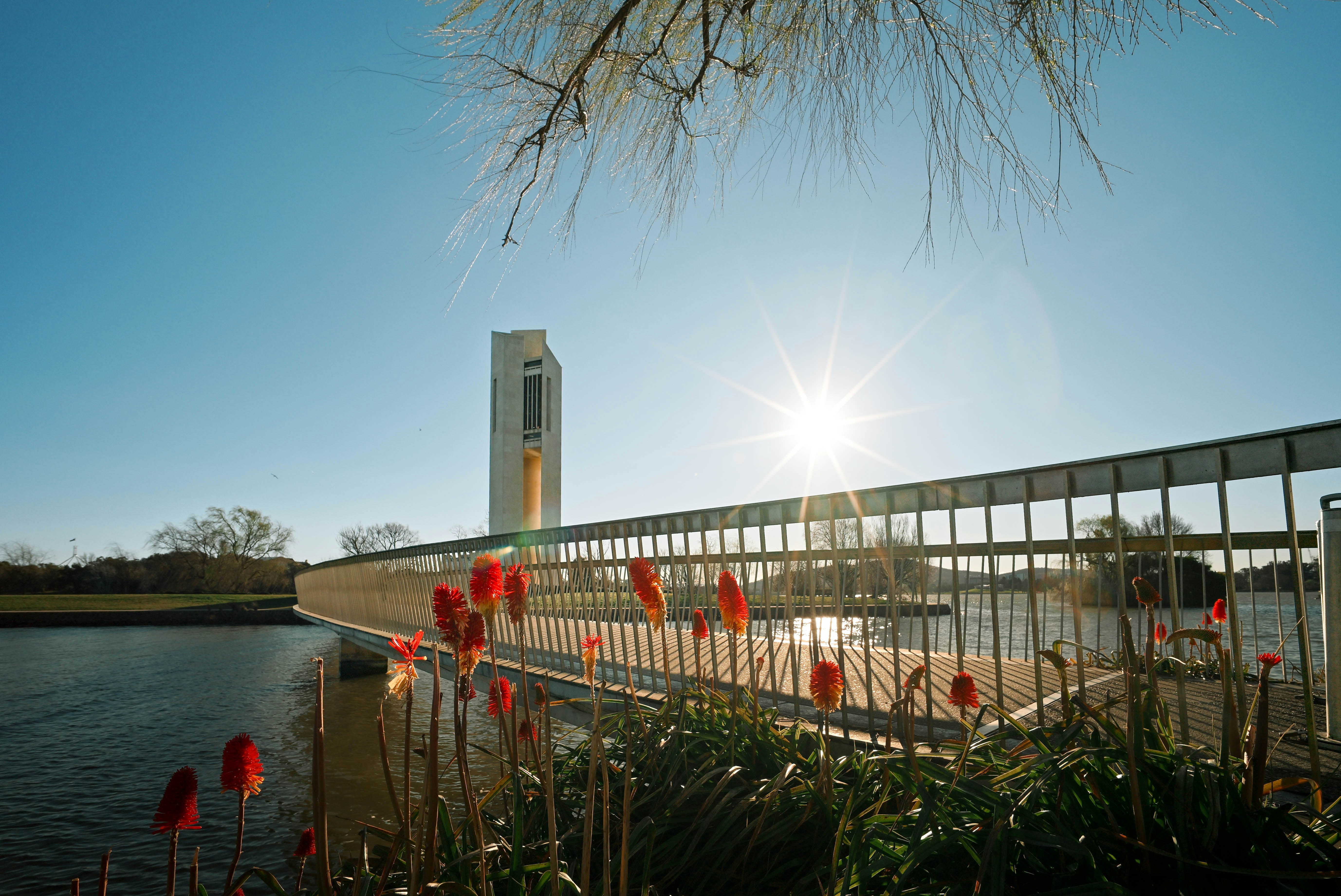 The National Carillon is an iconic 50-metre-high architectural tower located on Aspen Island in Canberra’s Lake Burley Griffin, holding 57 bronze bells. Gifted by the British Government in 1970 to mark Canberra's jubilee, it regularly hosts live concerts and illuminates the night sky with vibrant, seasonal light displays.