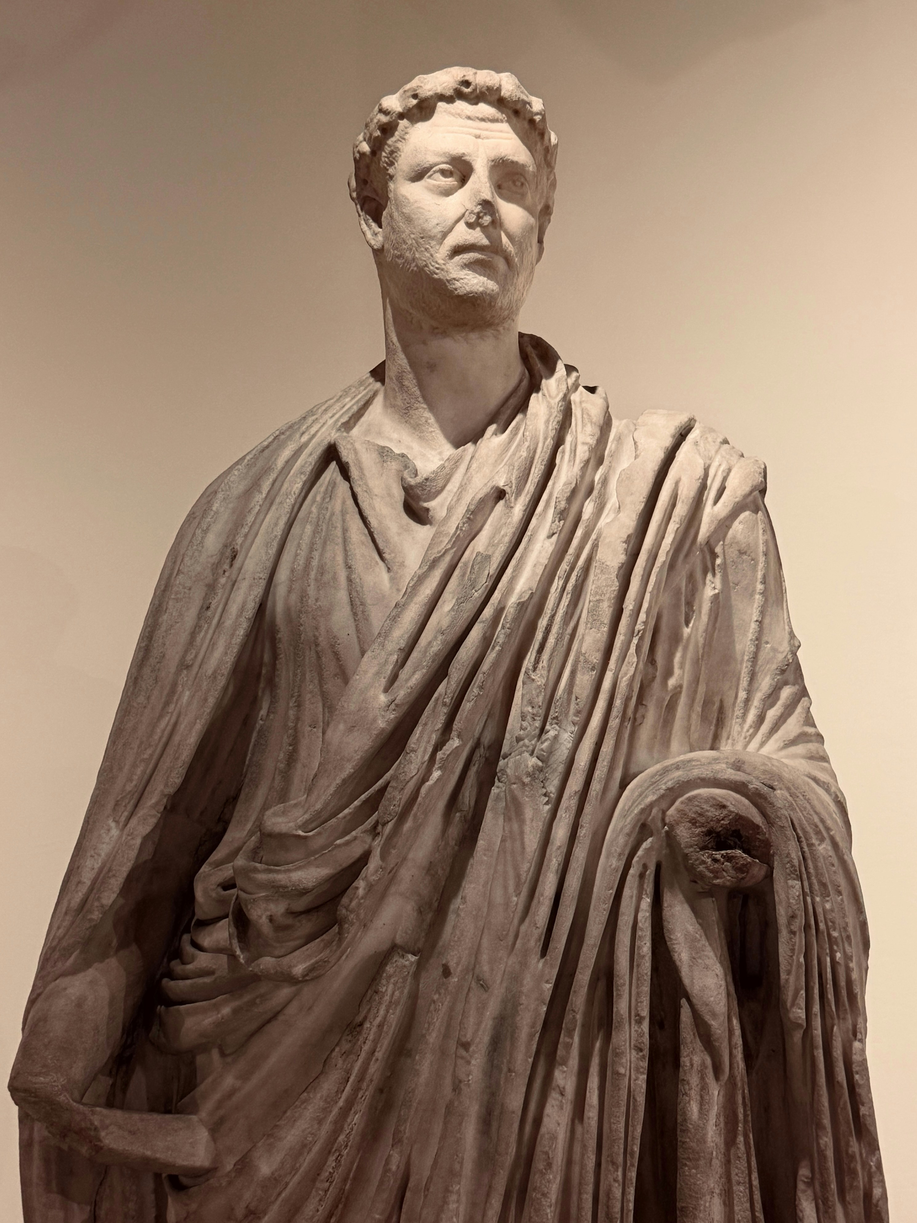 Statue of a Roman orator:stoic gaze in carved marble