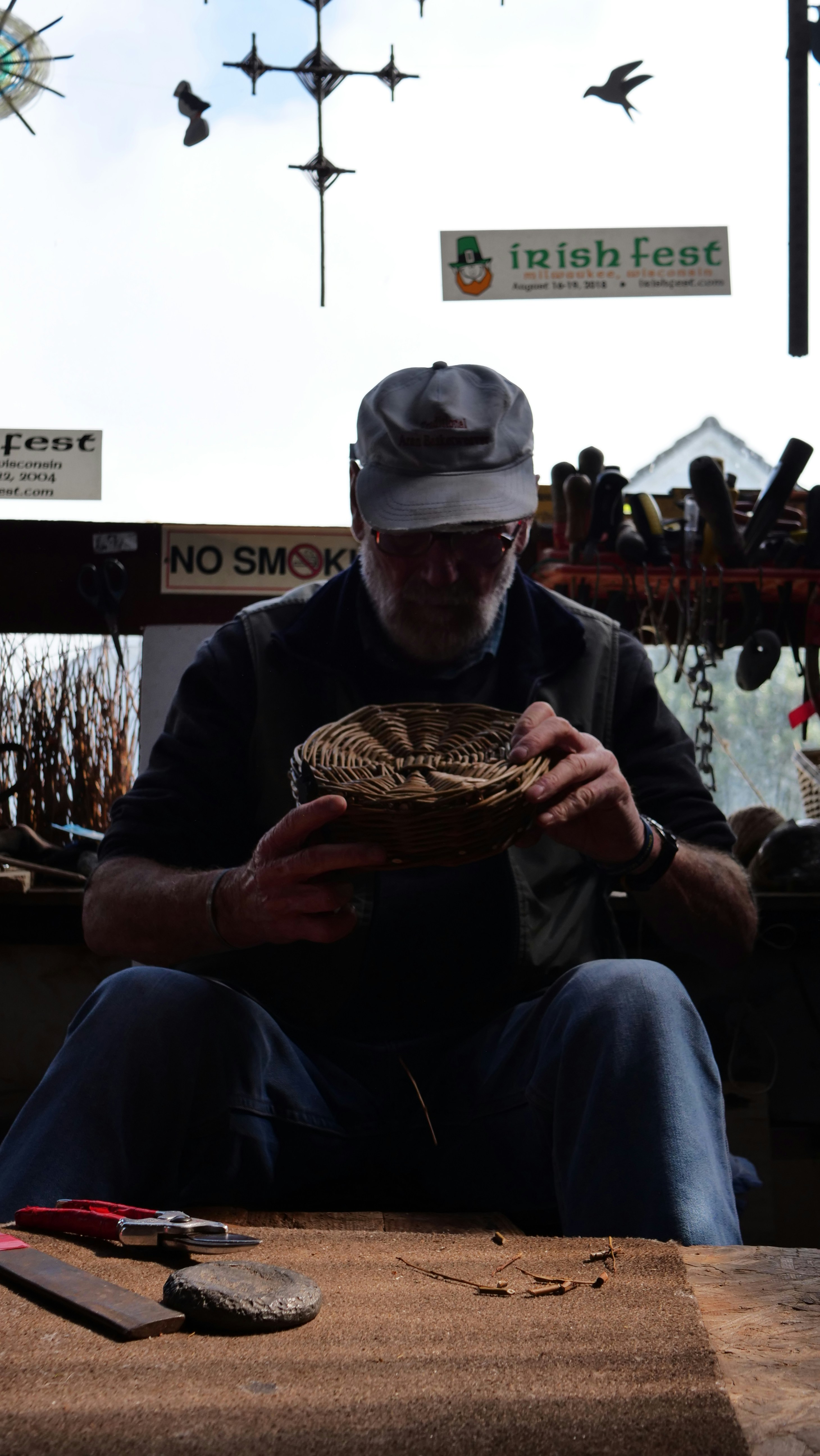 Basket Weaver in Quiet Focus at Irish Fest