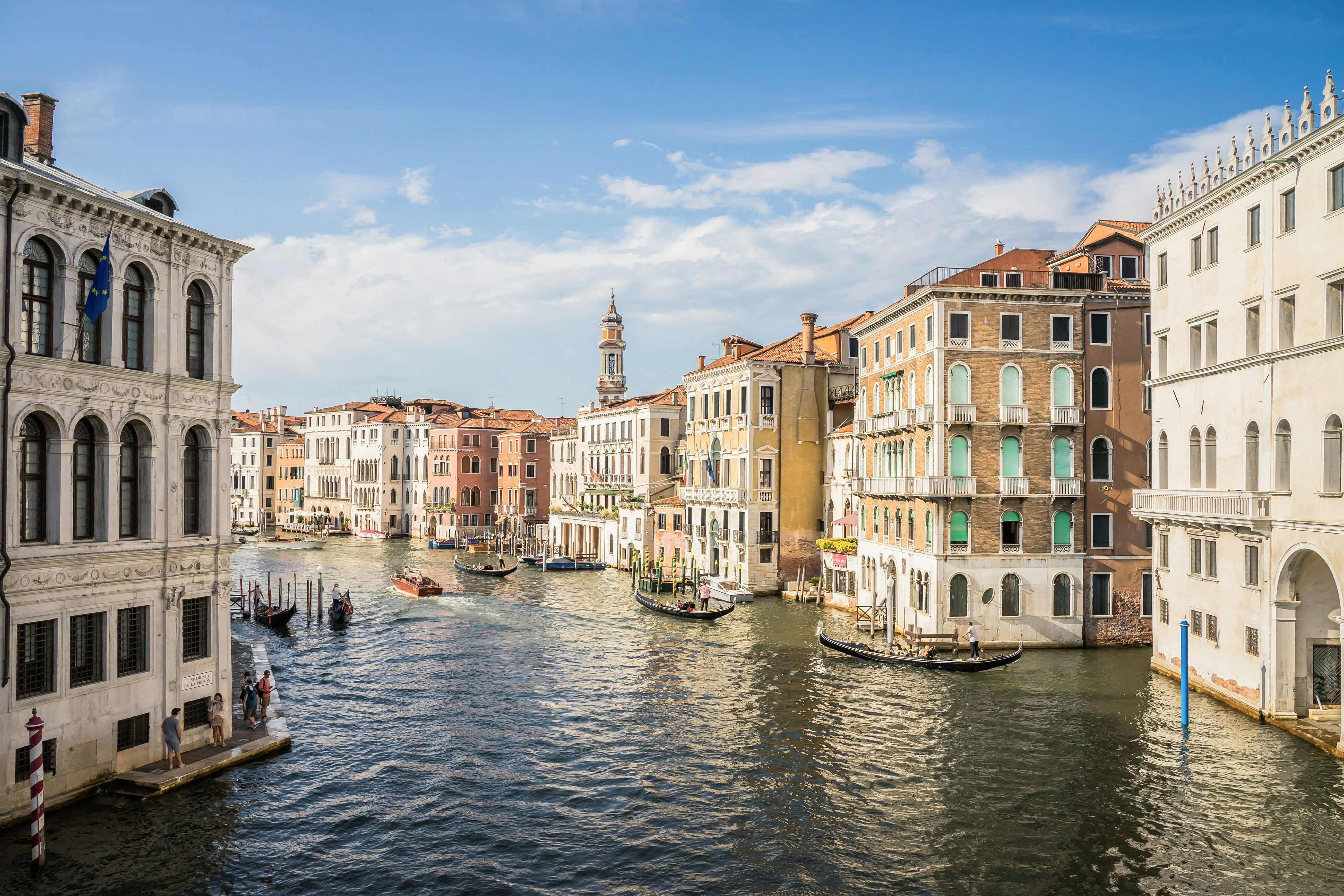 Canalfront Kaleidoscope: Boats, Buildings, and Reflections in Venice