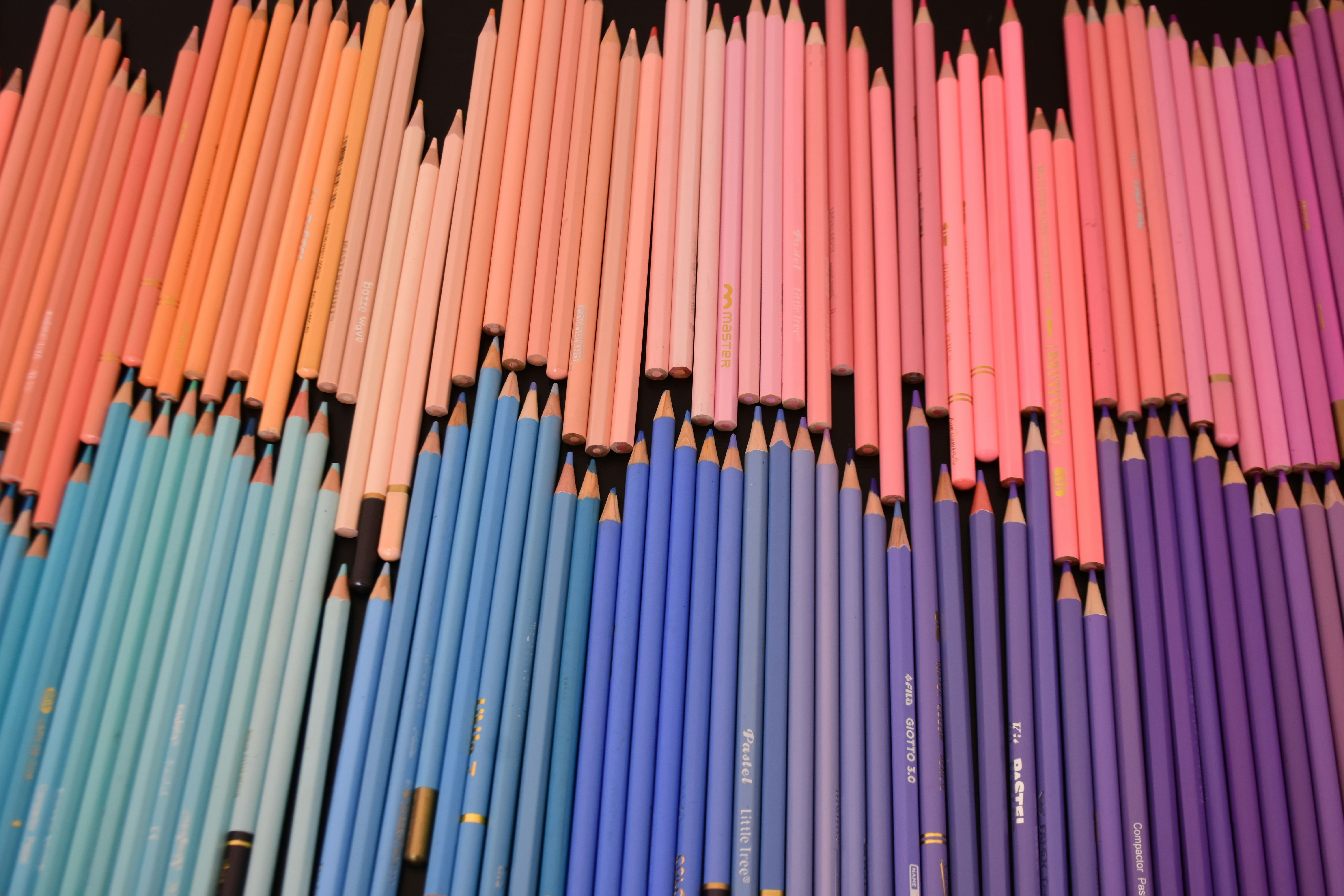 Chromatic Horizon: A Row of Prism-Hued Colored Pencils