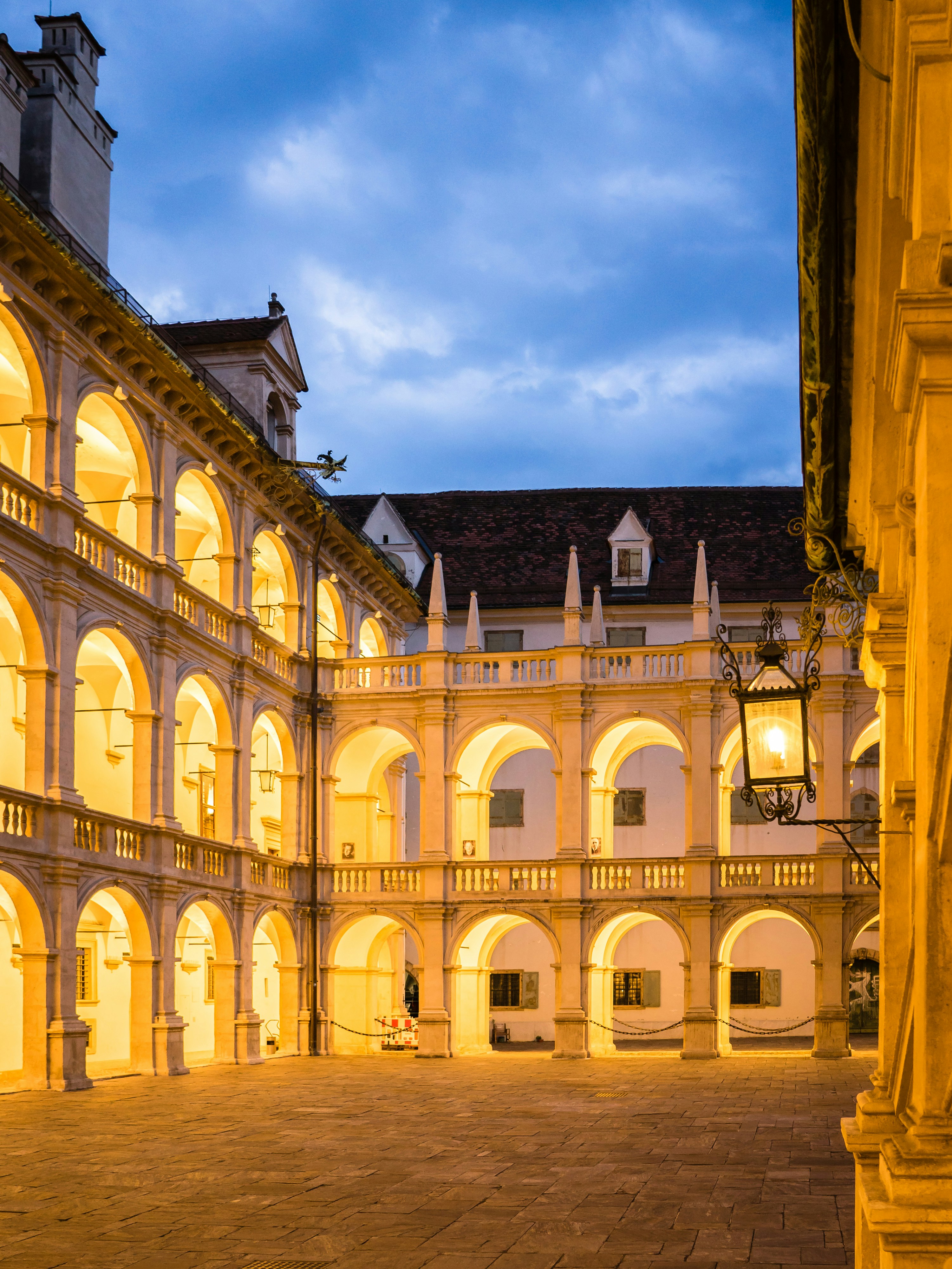 Golden Arcades: Evening Light Over the Courtyard of Lanterns